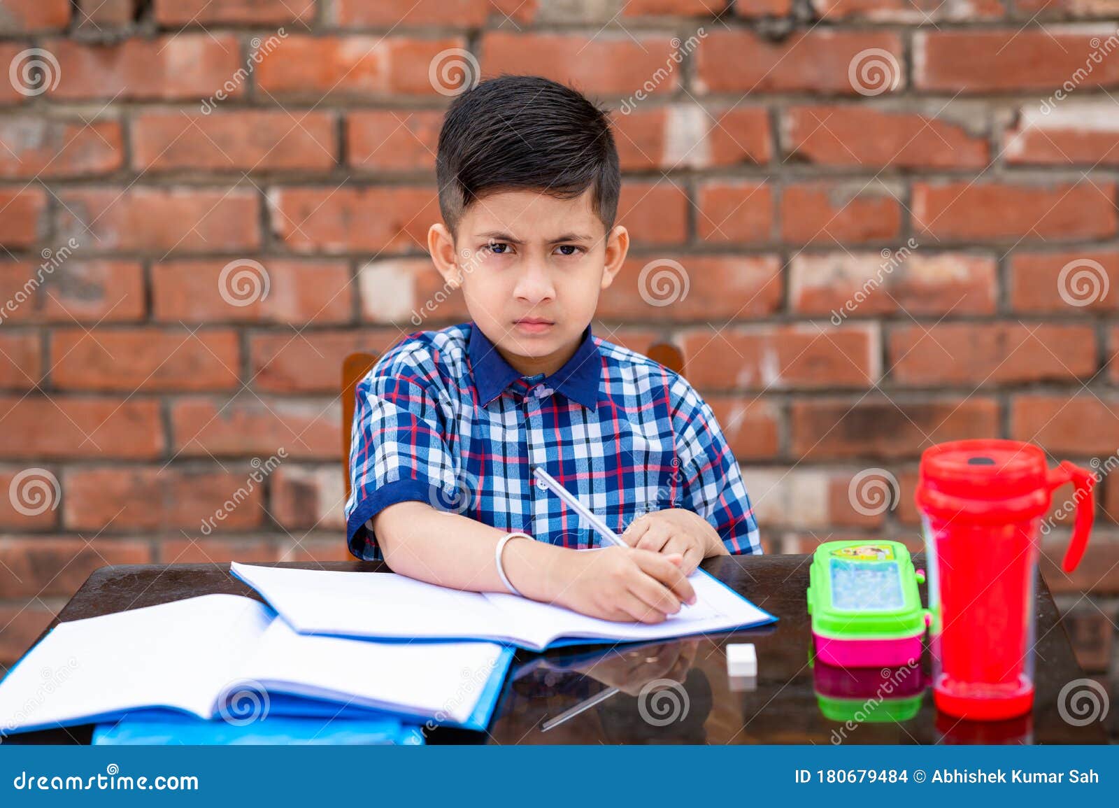 Cute Little Indian/Asian School Kid Studying on Study Table , Writing ...