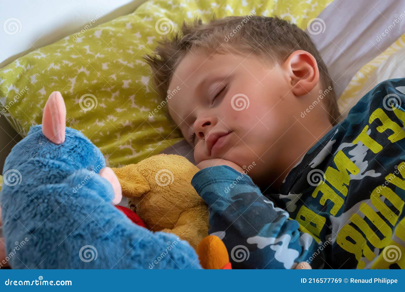 Cute little kid sleeping stock image. Image of adorable - 216577769
