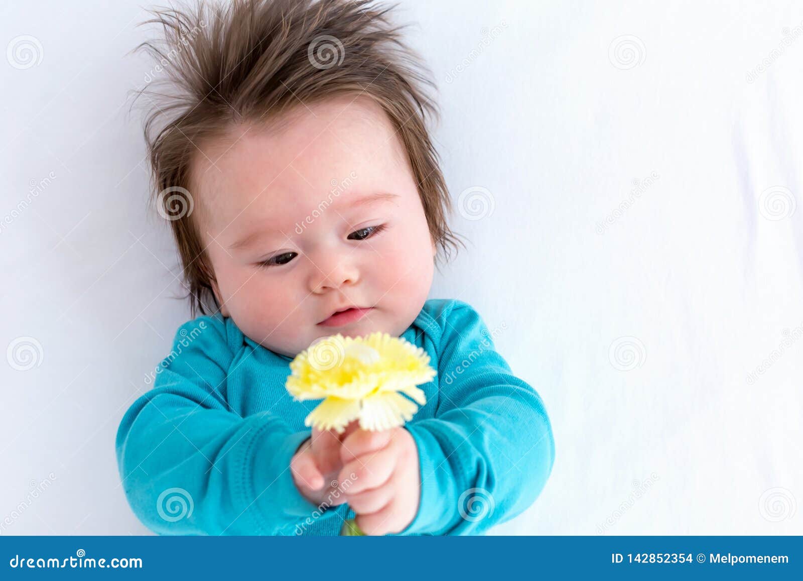 Baby boy with flowers stock photo. Image of father, adorable - 142852354