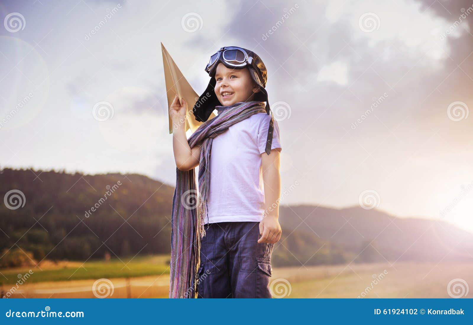Cute Little Pilot Holding a Toy Plane Stock Photo - Image of idea, face ...