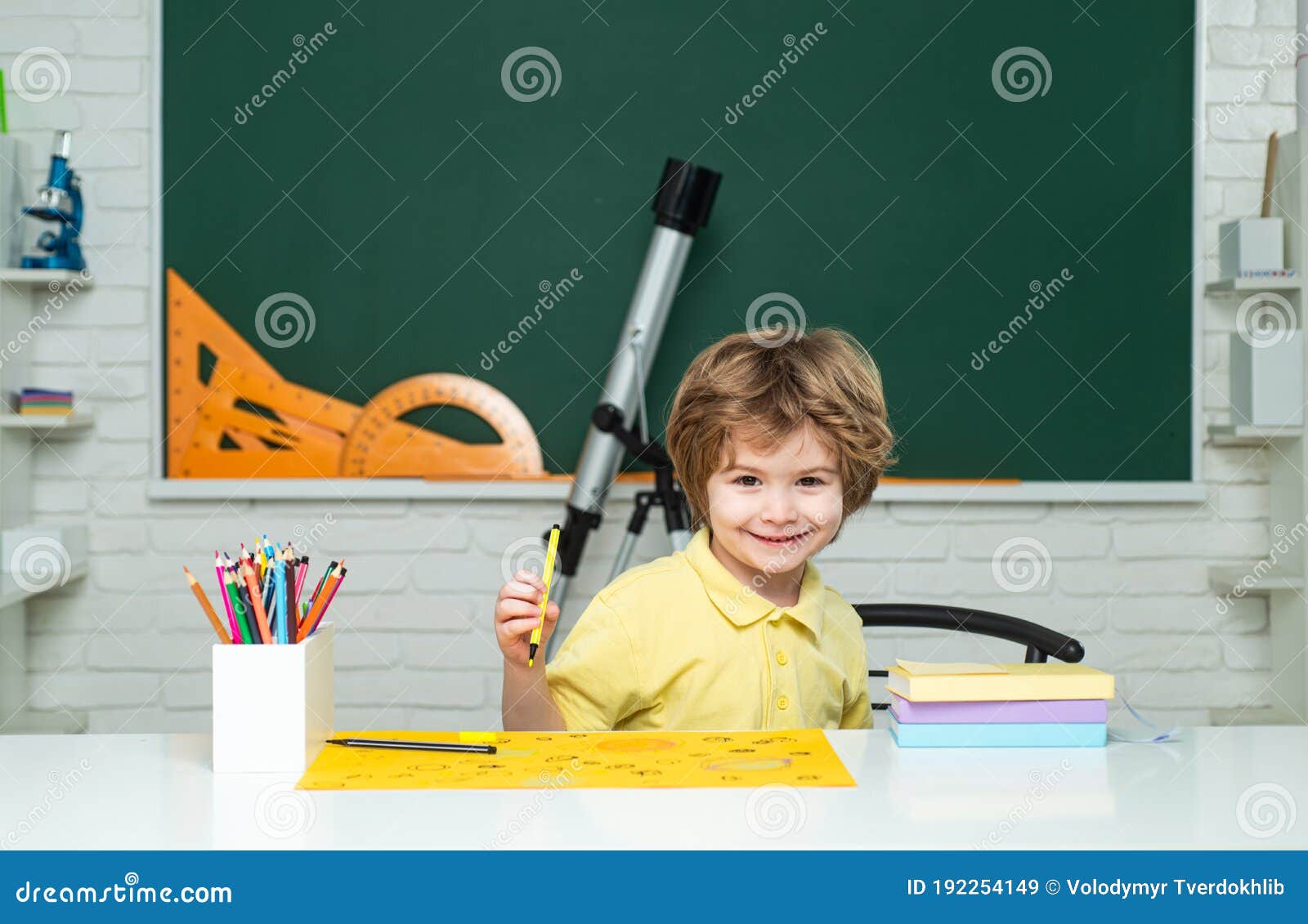 Cute Little Preschool Kid Boy with Teacher Study in a Classroom ...