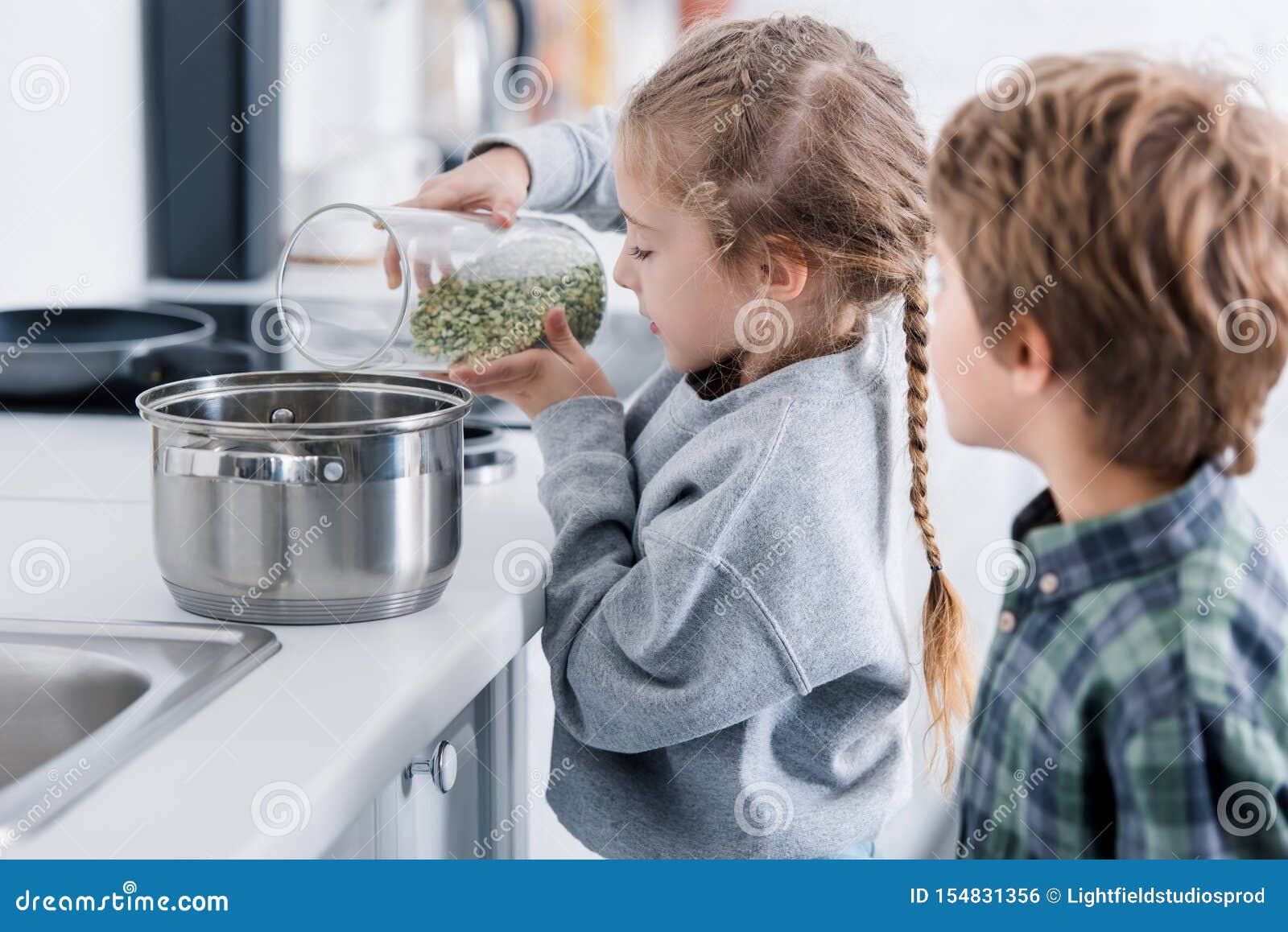 Cute Little Siblings Cooking Together Stock Photo - Image of ...