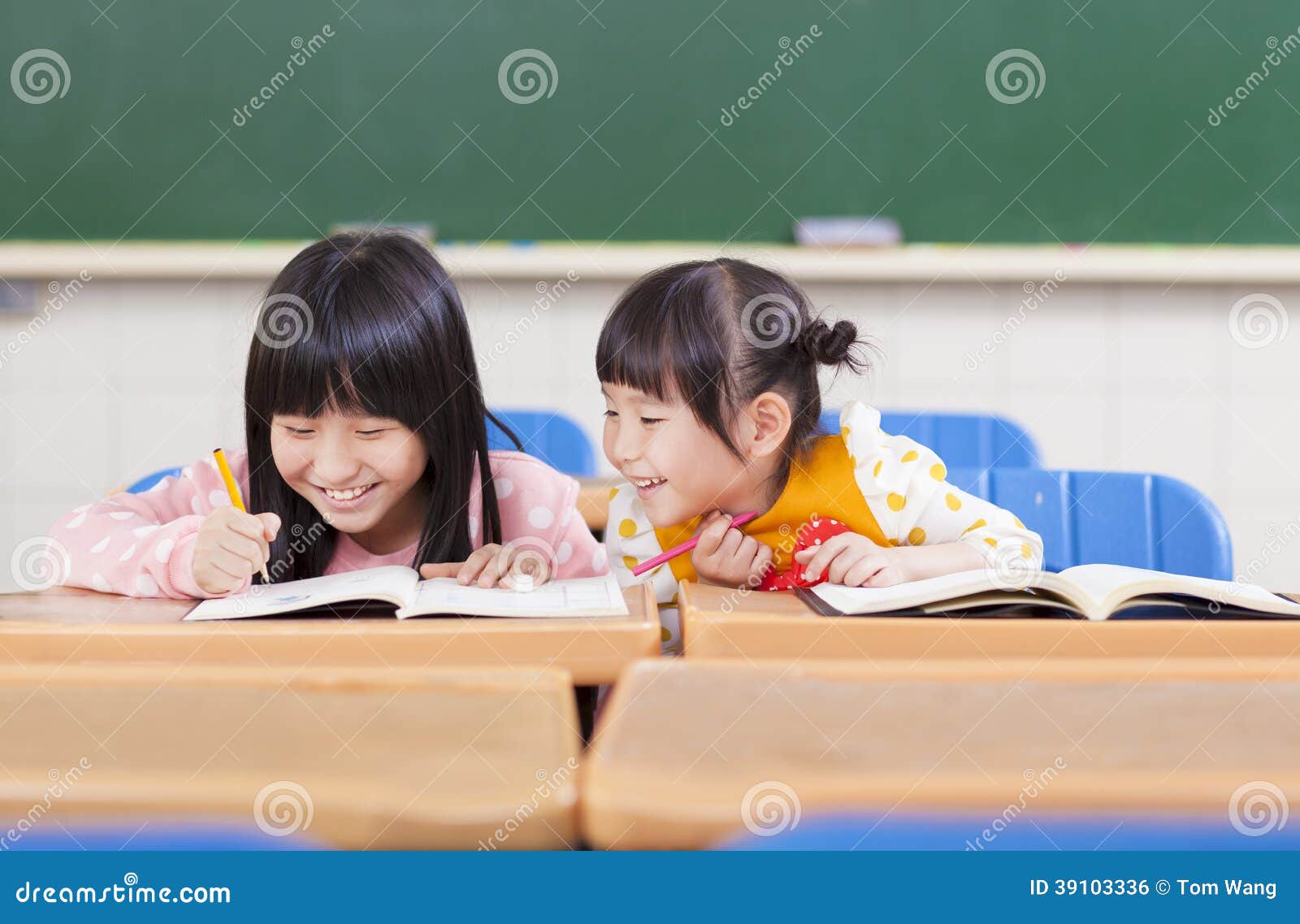 Cute Little Student Look Her Classmate Homework Stock Photo - Image of ...