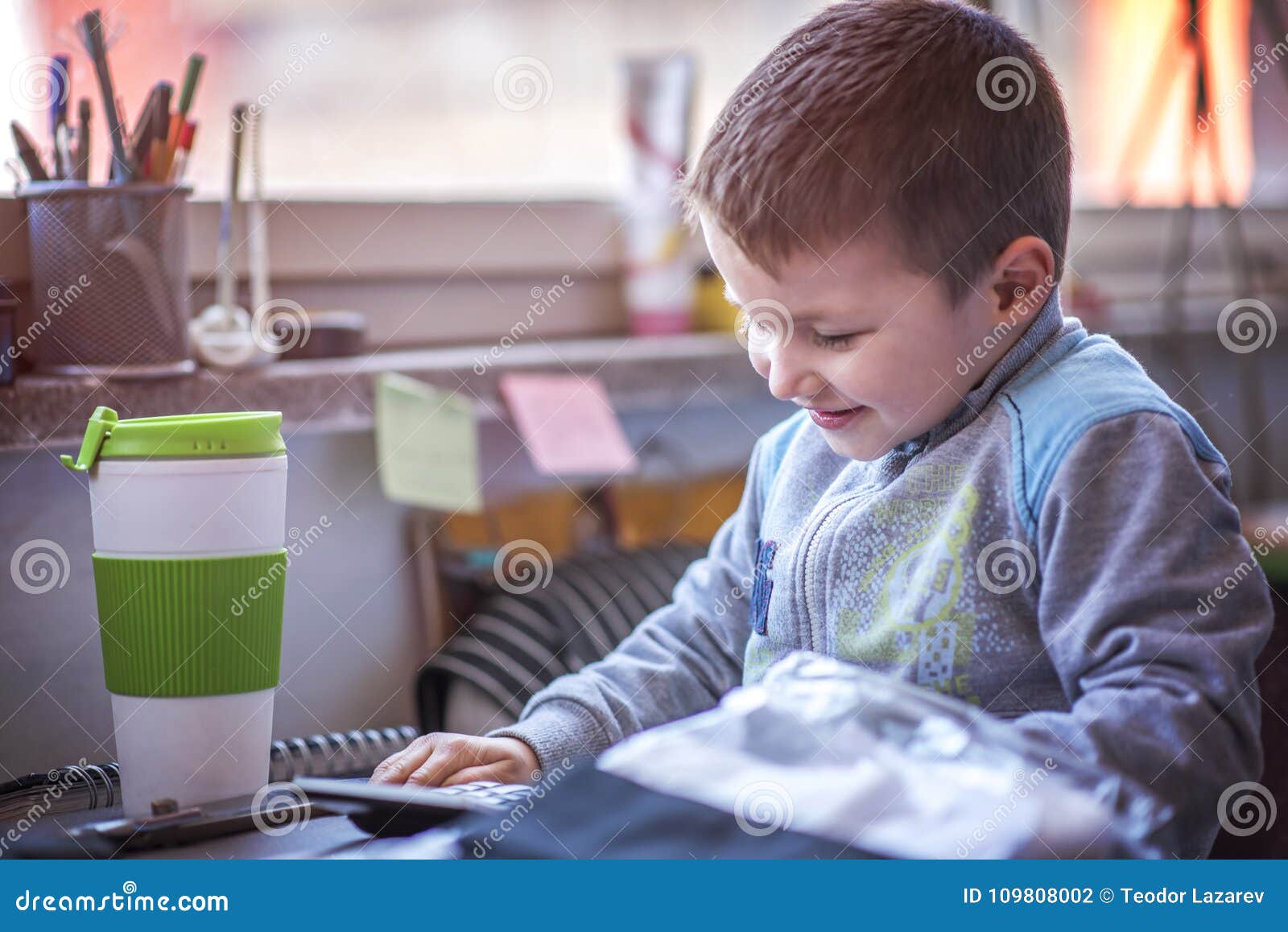 Cute Little Baby Boy Using a Calculator Stock Photo - Image of ...