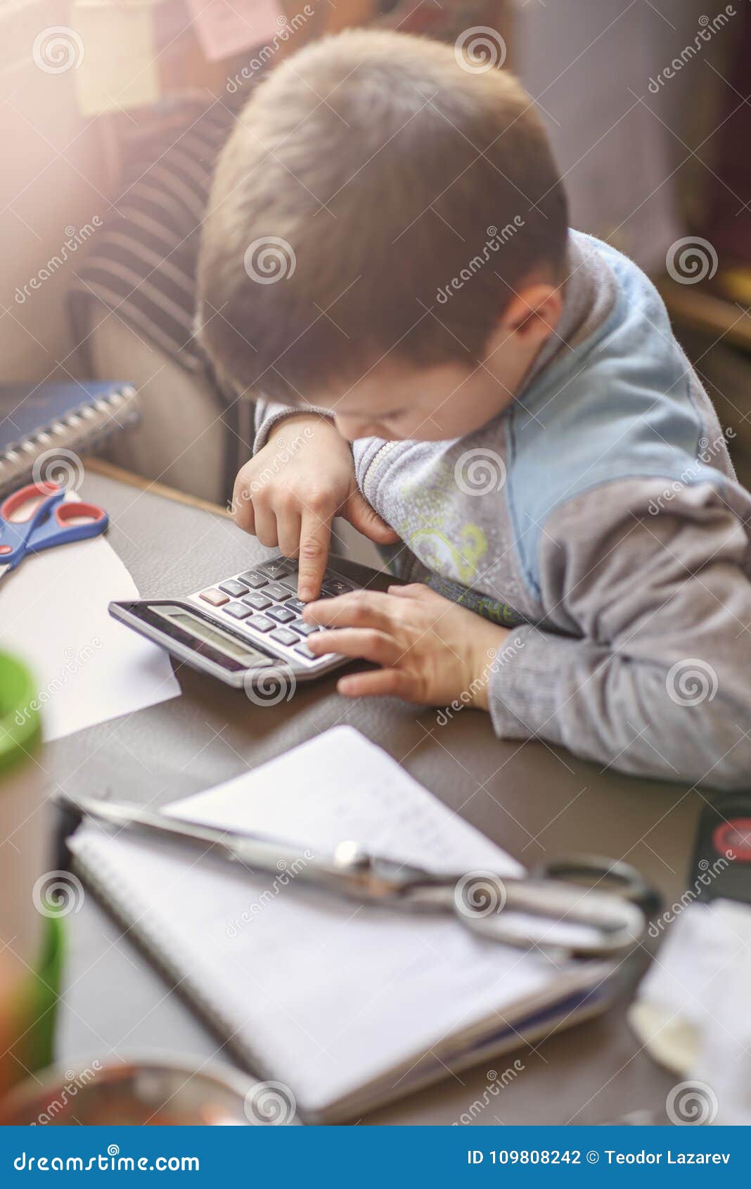 Cute Little Baby Boy Using a Calculator Stock Photo - Image of ...