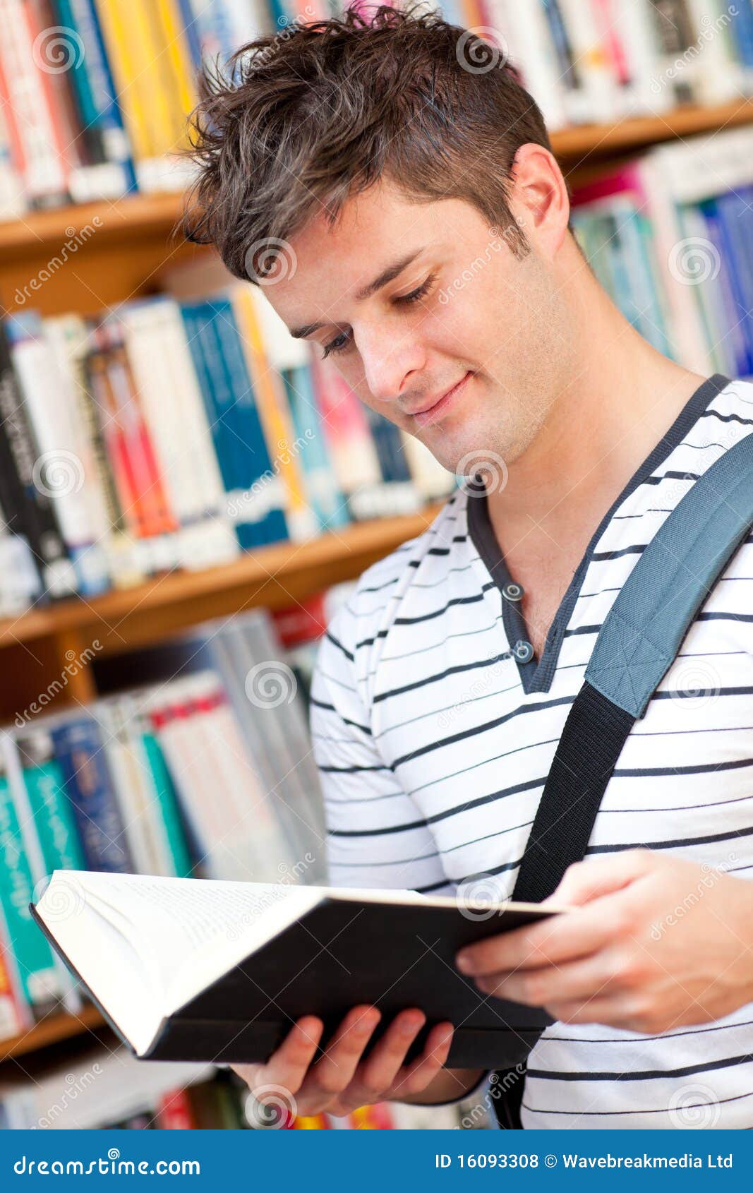 Cute Male Student Reading a Book Stock Photo - Image of person ...