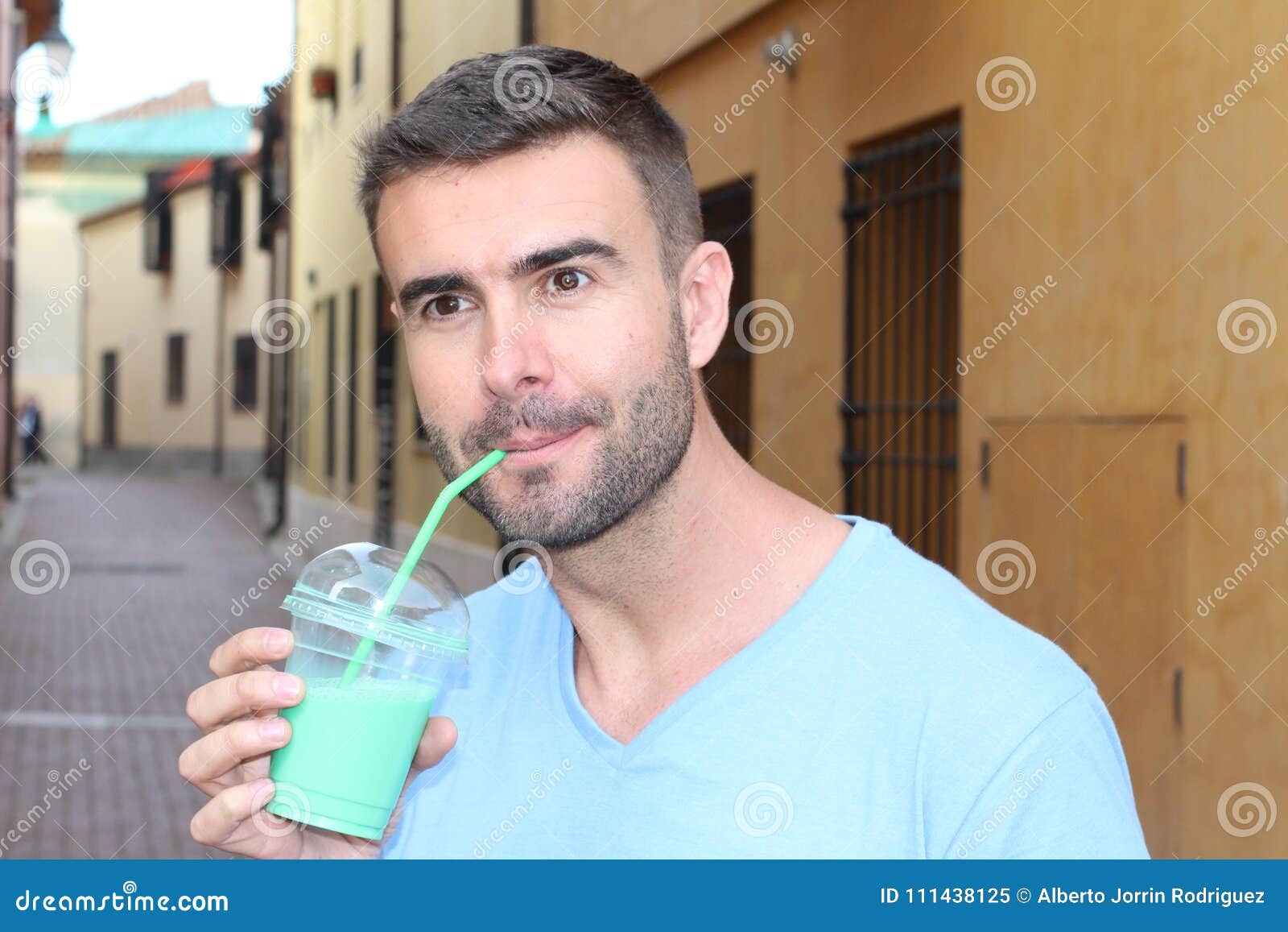 Cute Man Drinking a Shake Outdoors Stock Image - Image of beverage ...