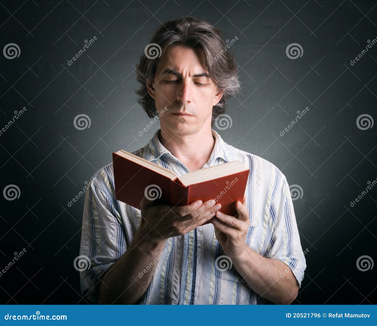 Cute man reading a book stock photo. Image of professional - 20521796