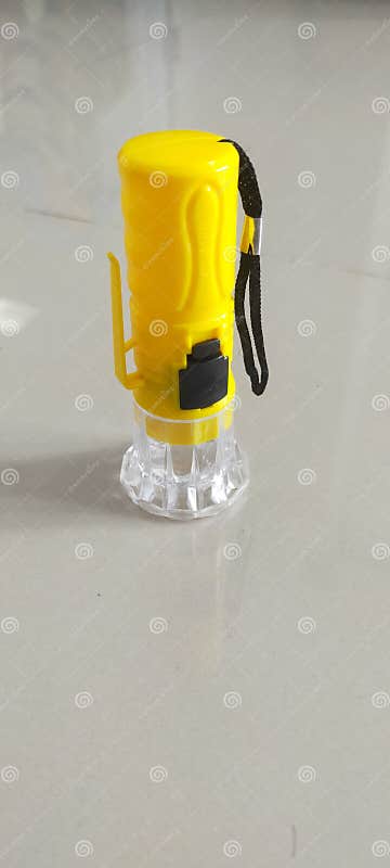Cute Mini Flashlight Made of Plastic Suitable for Children Stock Photo ...