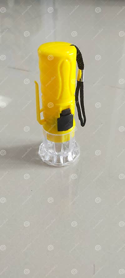 Cute Mini Flashlight Made of Plastic Suitable for Children Stock Photo ...