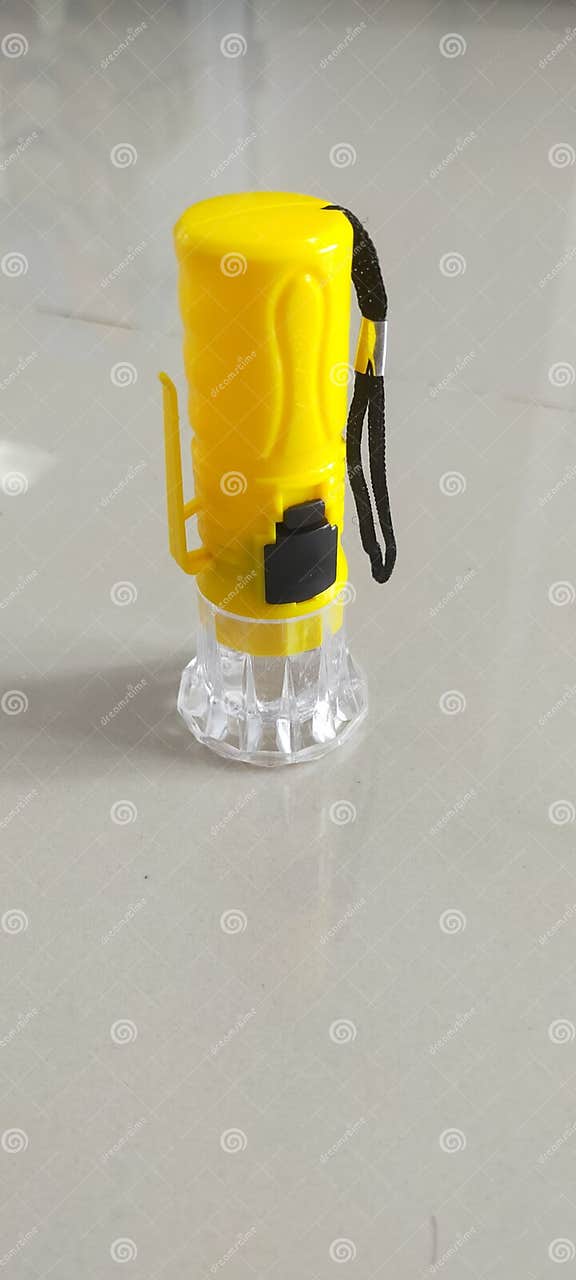 Cute Mini Flashlight Made of Plastic Suitable for Children Stock Photo ...