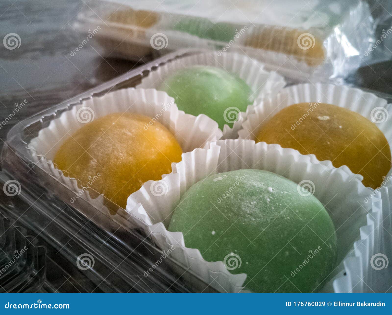 Cute Mochi in Green and Yellow Colour in a Takeaway Container Box Stock ...