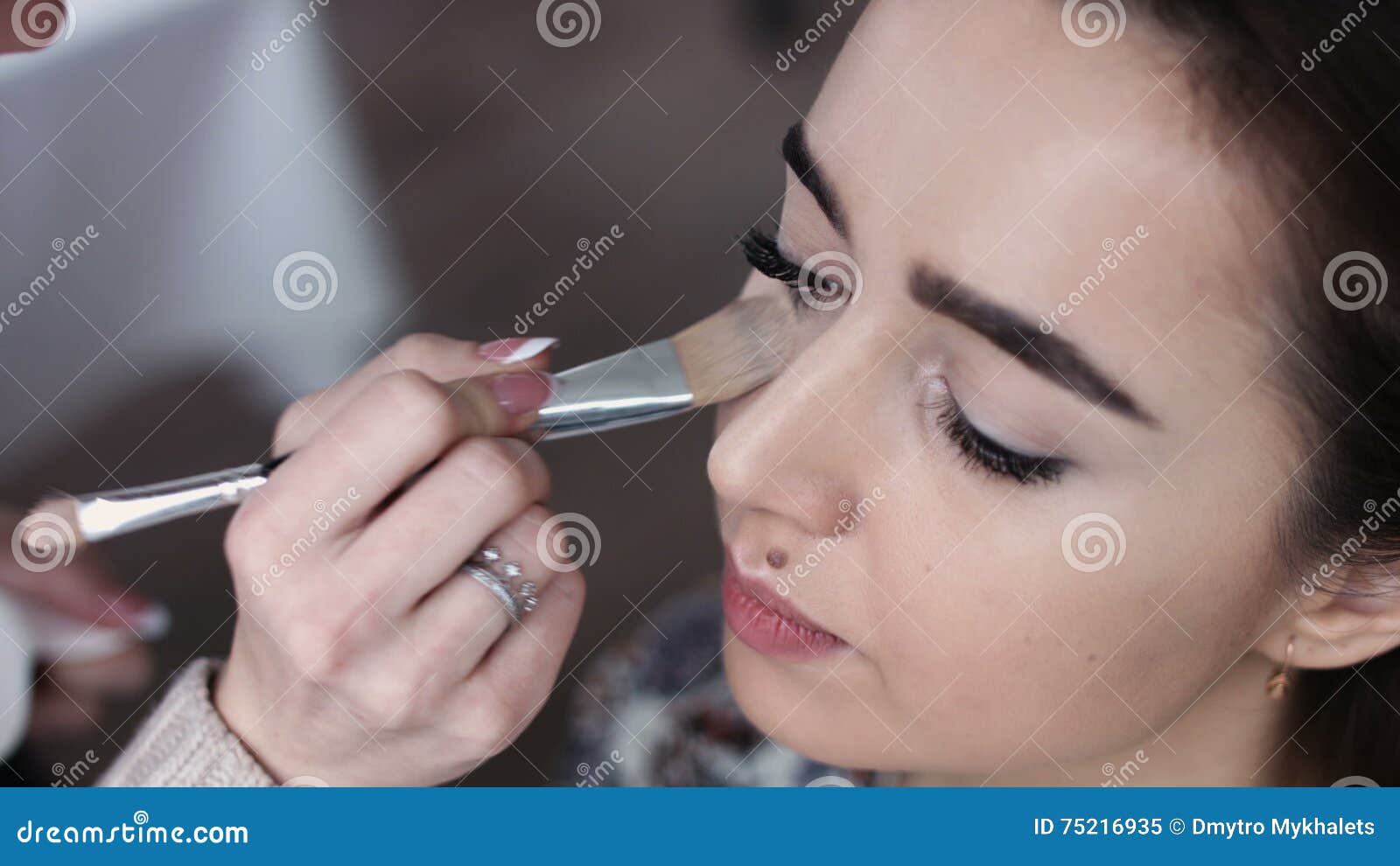 A Cute Model Gets Makeup Put on before Her Shoot. Close Up Shot Stock ...