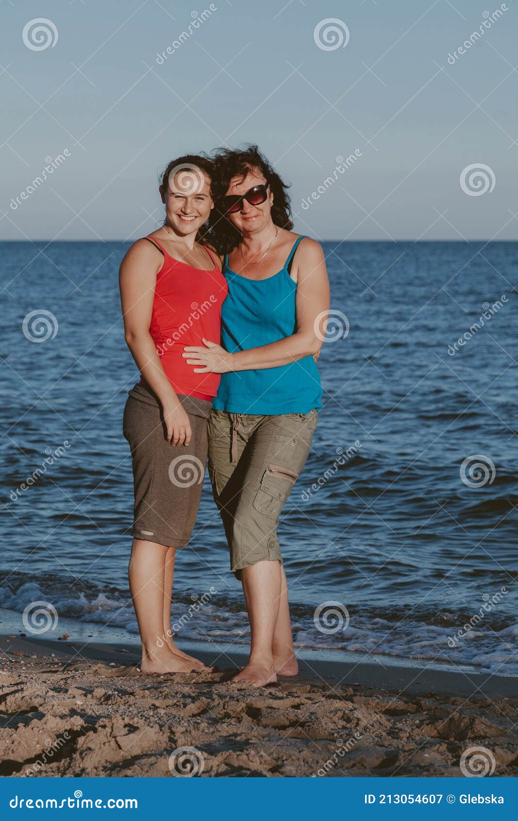 Cute Mommy And Adult Daughter Stand On Seashore Stock Image Image Of