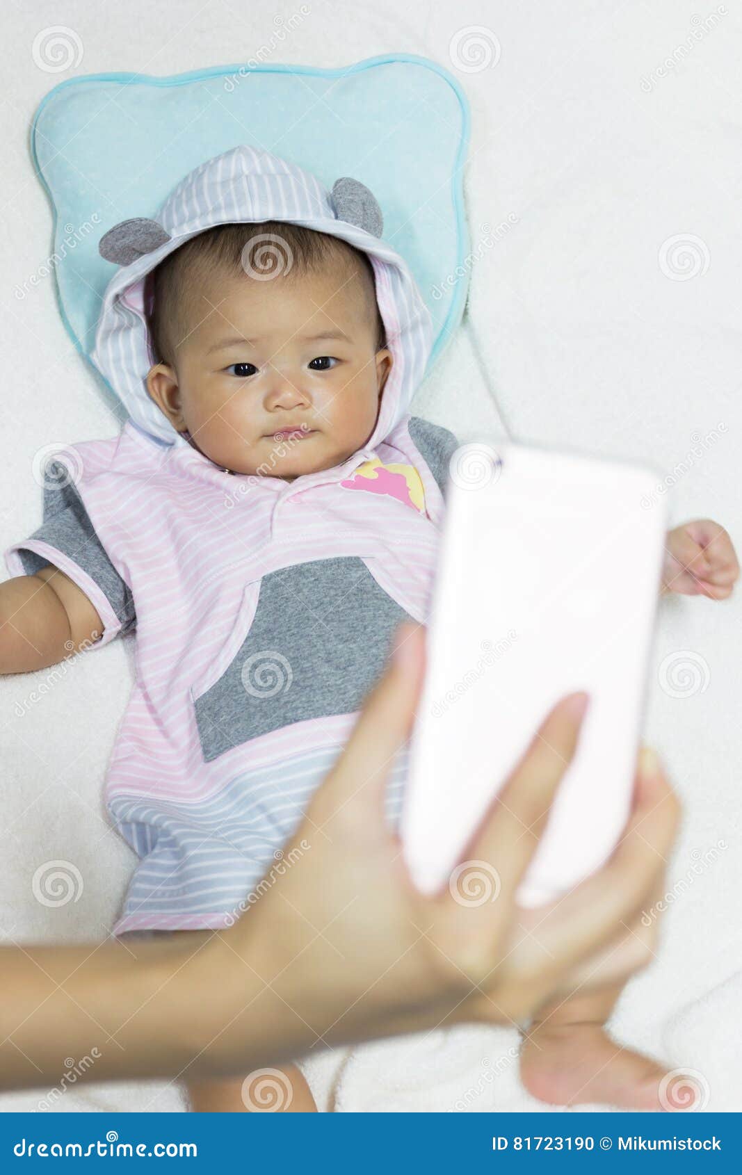 Cute New Born Baby Looking Mobile Phone. Stock Photo - Image of hand ...