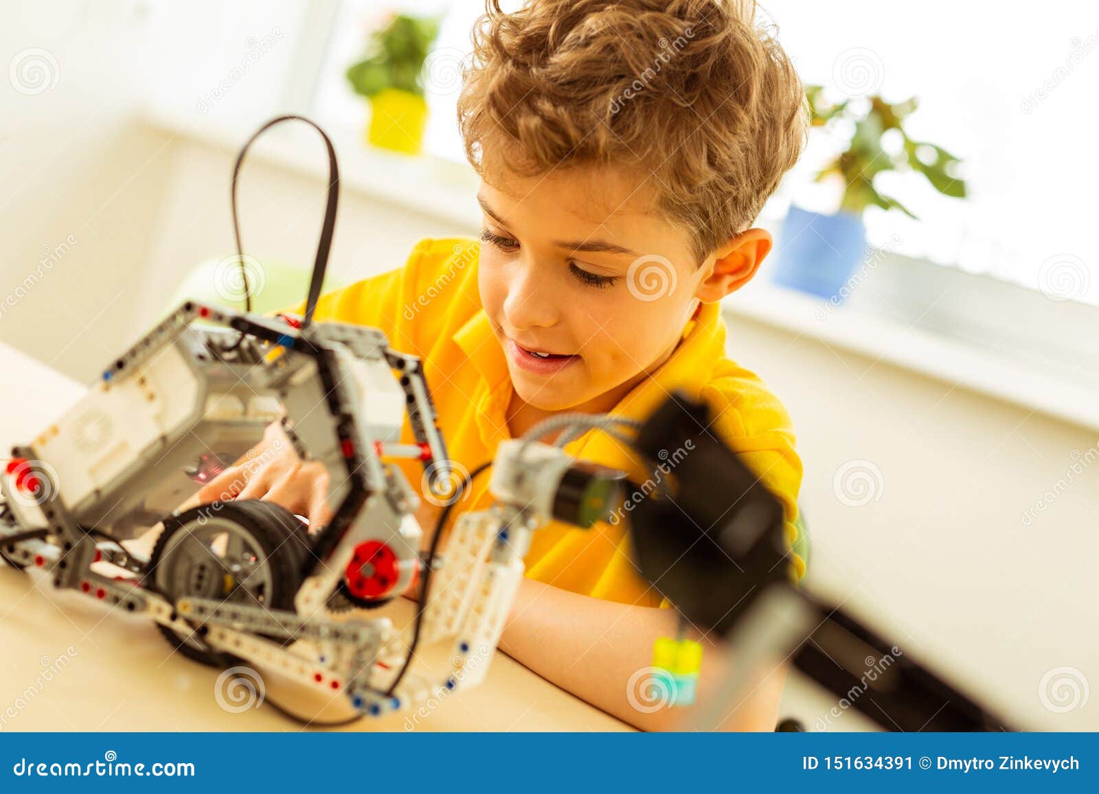 Cute Pleasant Boy Looking at His Finished Project Stock Image - Image ...