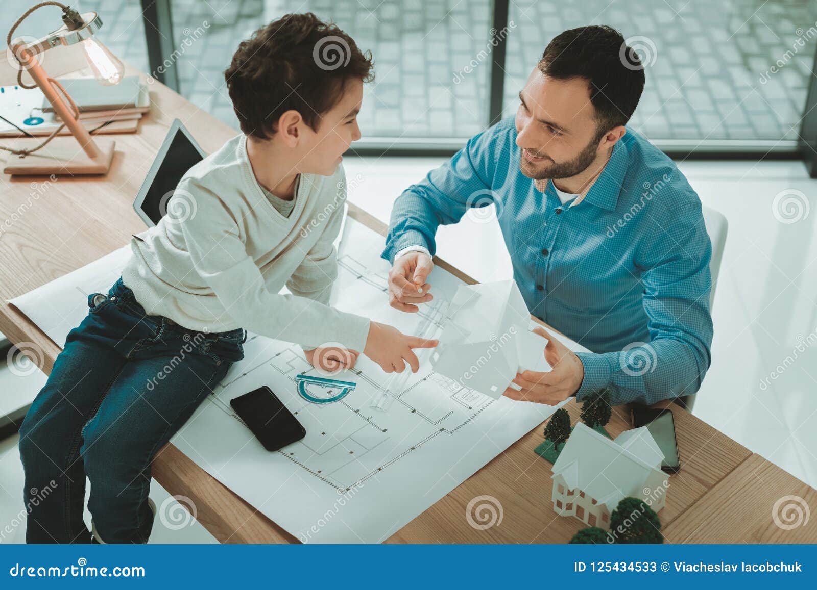 Cute Positive Boy Pointing at the House Model Stock Image - Image of ...