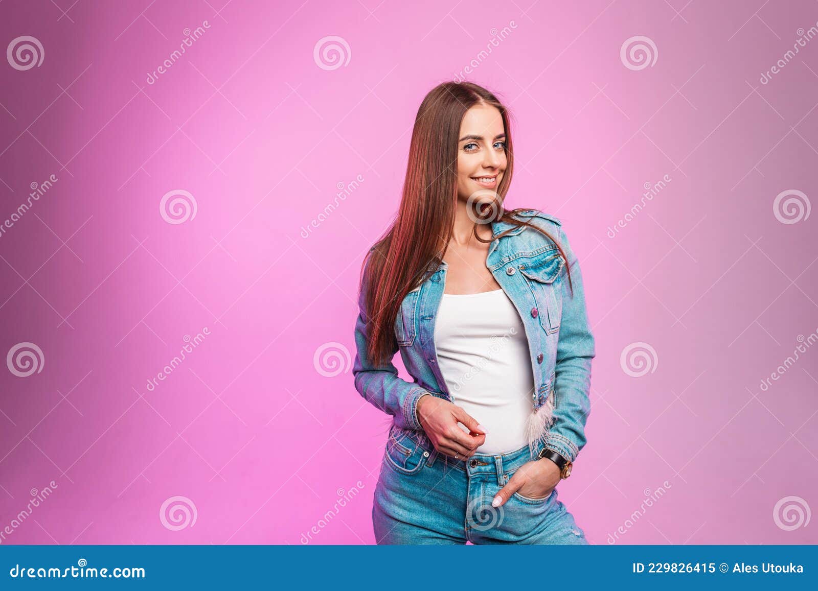 Cute Positive Young Woman With Cute Smile In Blue Fashionable Denim