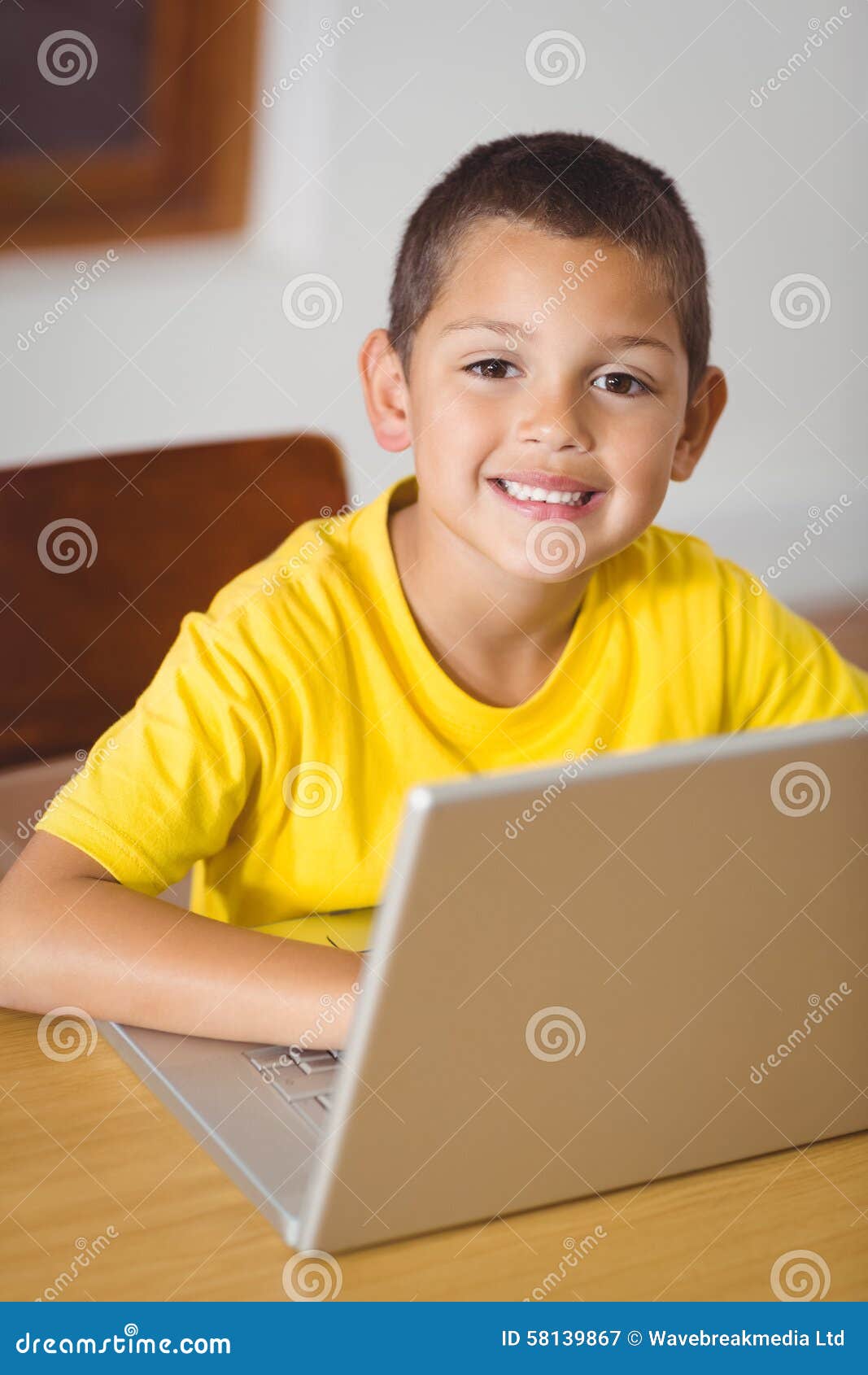 Cute Pupil in Class Using Laptop Stock Image - Image of indoors ...
