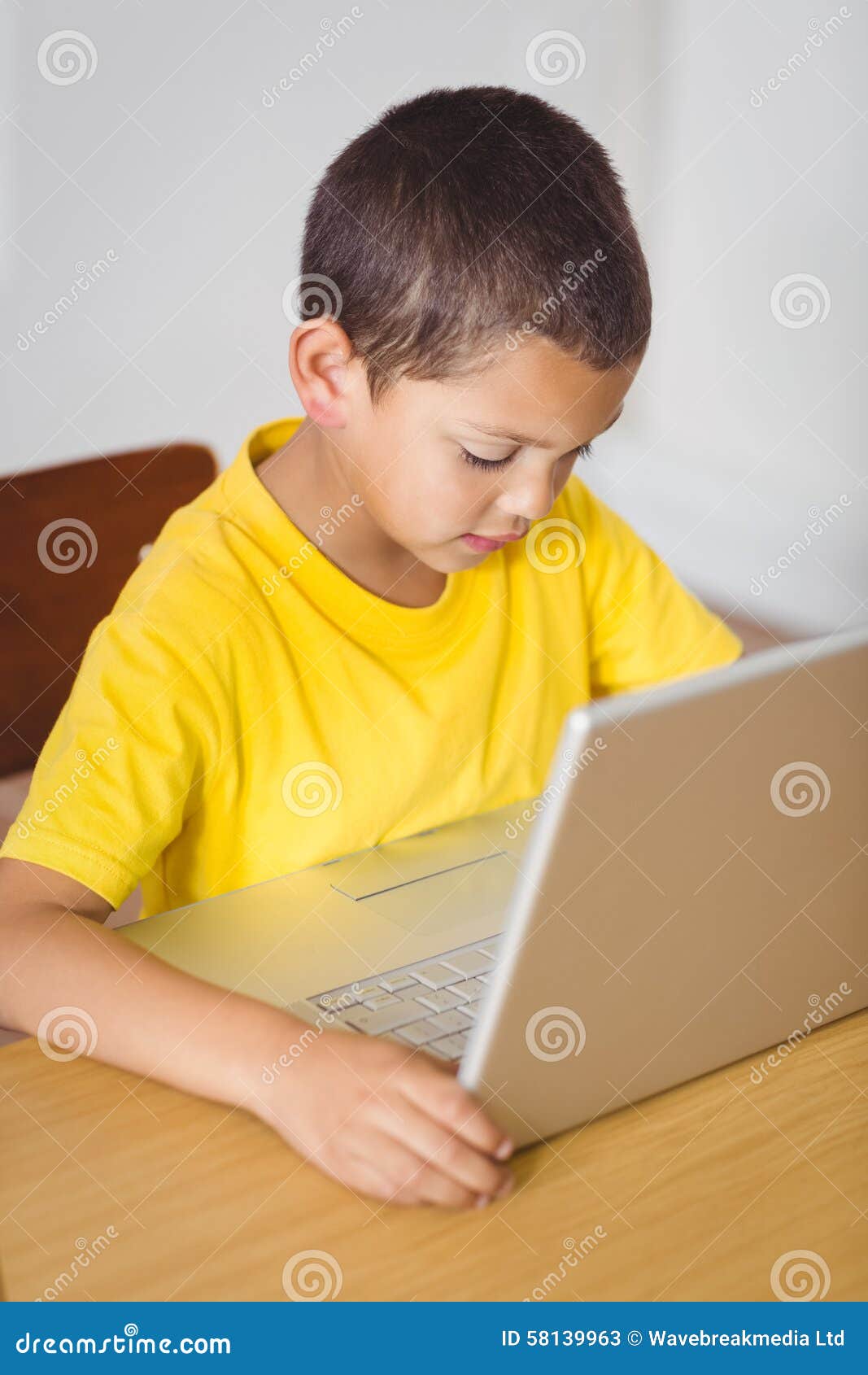 Cute Pupil in Class Using Laptop Stock Image - Image of education ...
