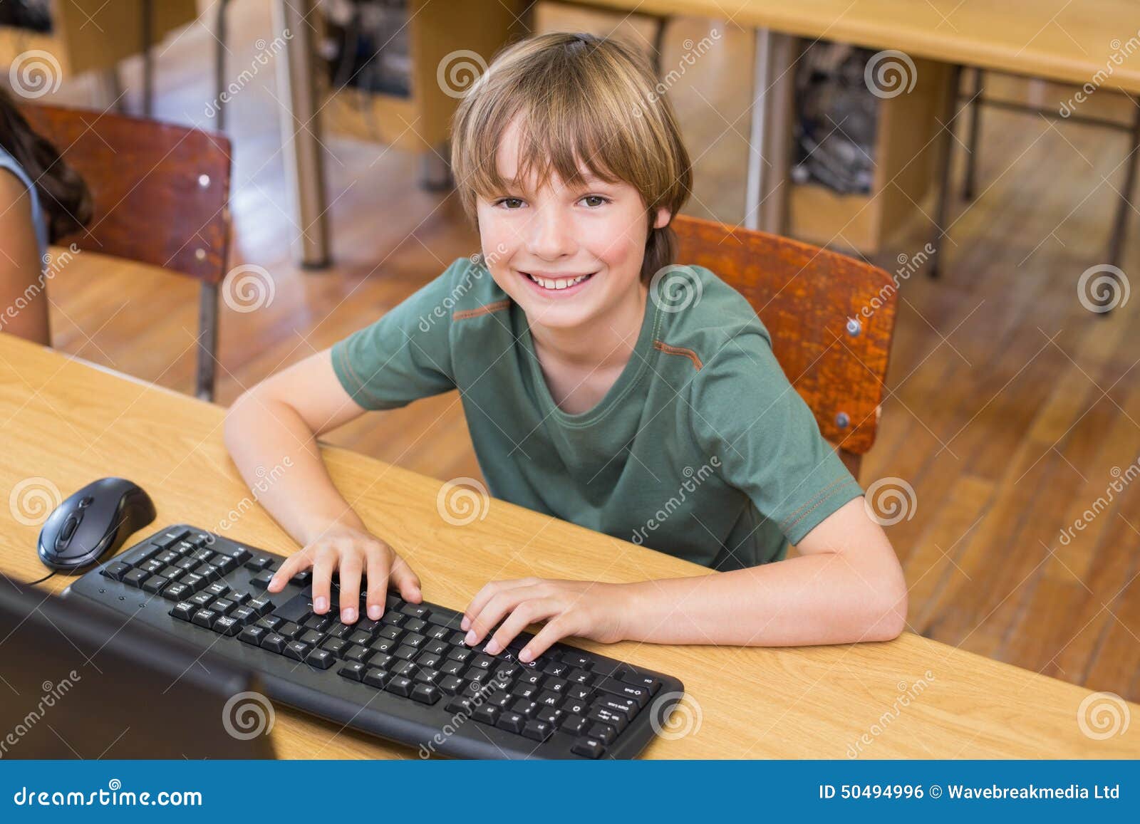 Cute Pupil in Computer Class Stock Photo - Image of academic, keyboard ...