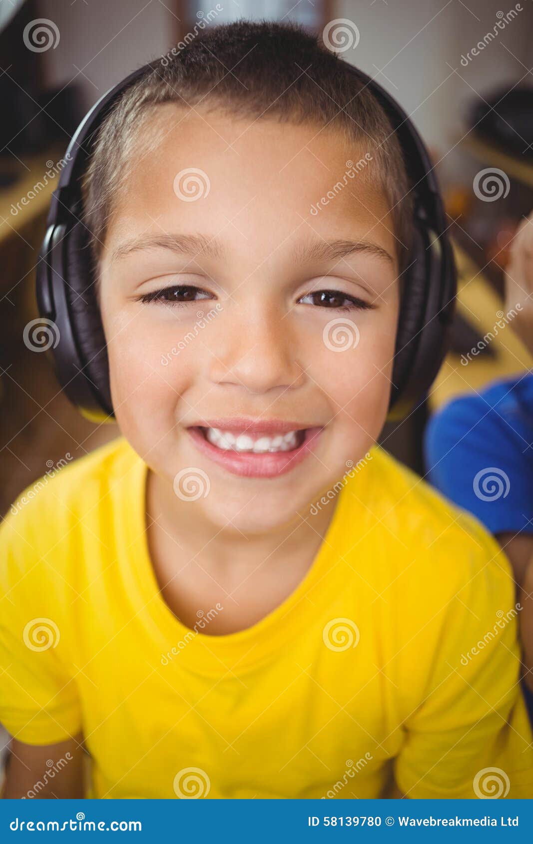 Cute Pupil in Computer Class Smiling at Camera Stock Photo - Image of ...
