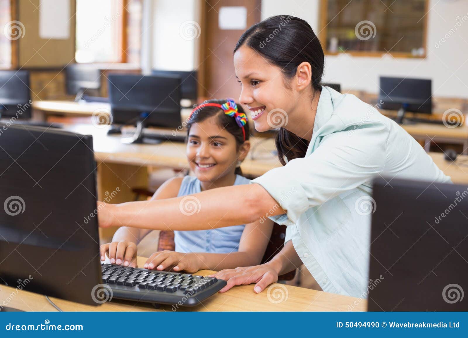 Cute Pupil in Computer Class with Teacher Stock Photo - Image of ...
