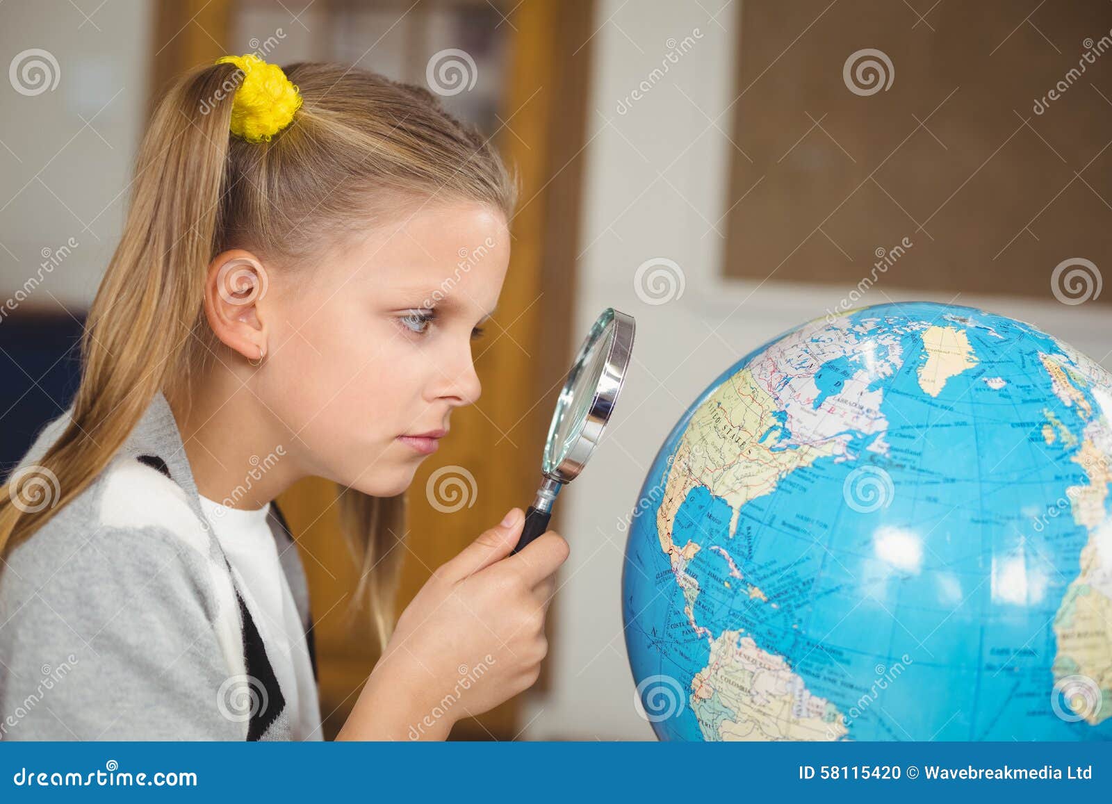 Cute Pupil Looking at Globe through Magnifier Stock Photo - Image of ...
