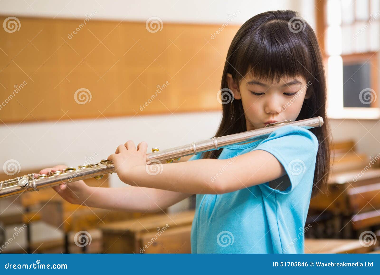 Cute Pupil Playing Flute in Classroom Stock Photo - Image of musical ...