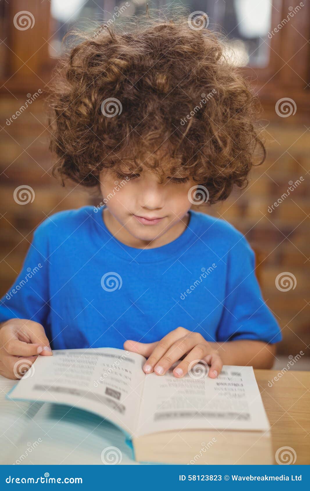 Cute Pupil Reading Book in the Library Stock Image - Image of cheerful ...