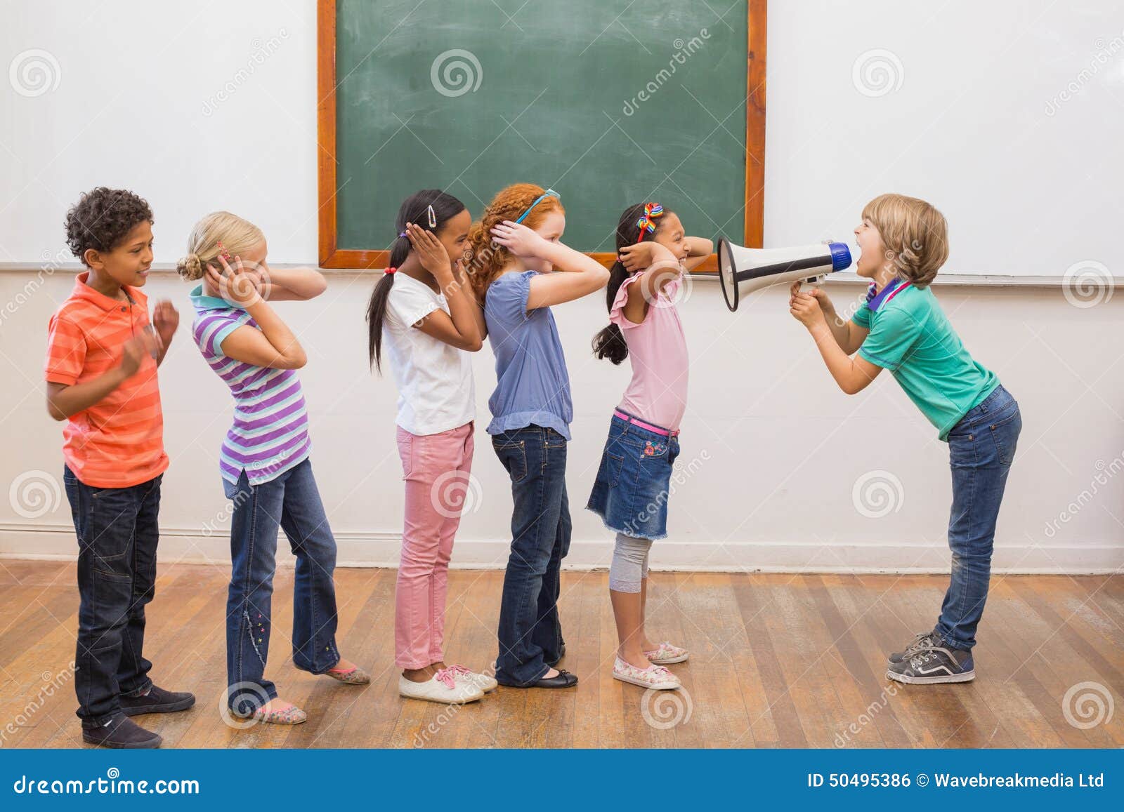 Cute Pupil Shouting in Classroom Stock Photo - Image of ears, group ...