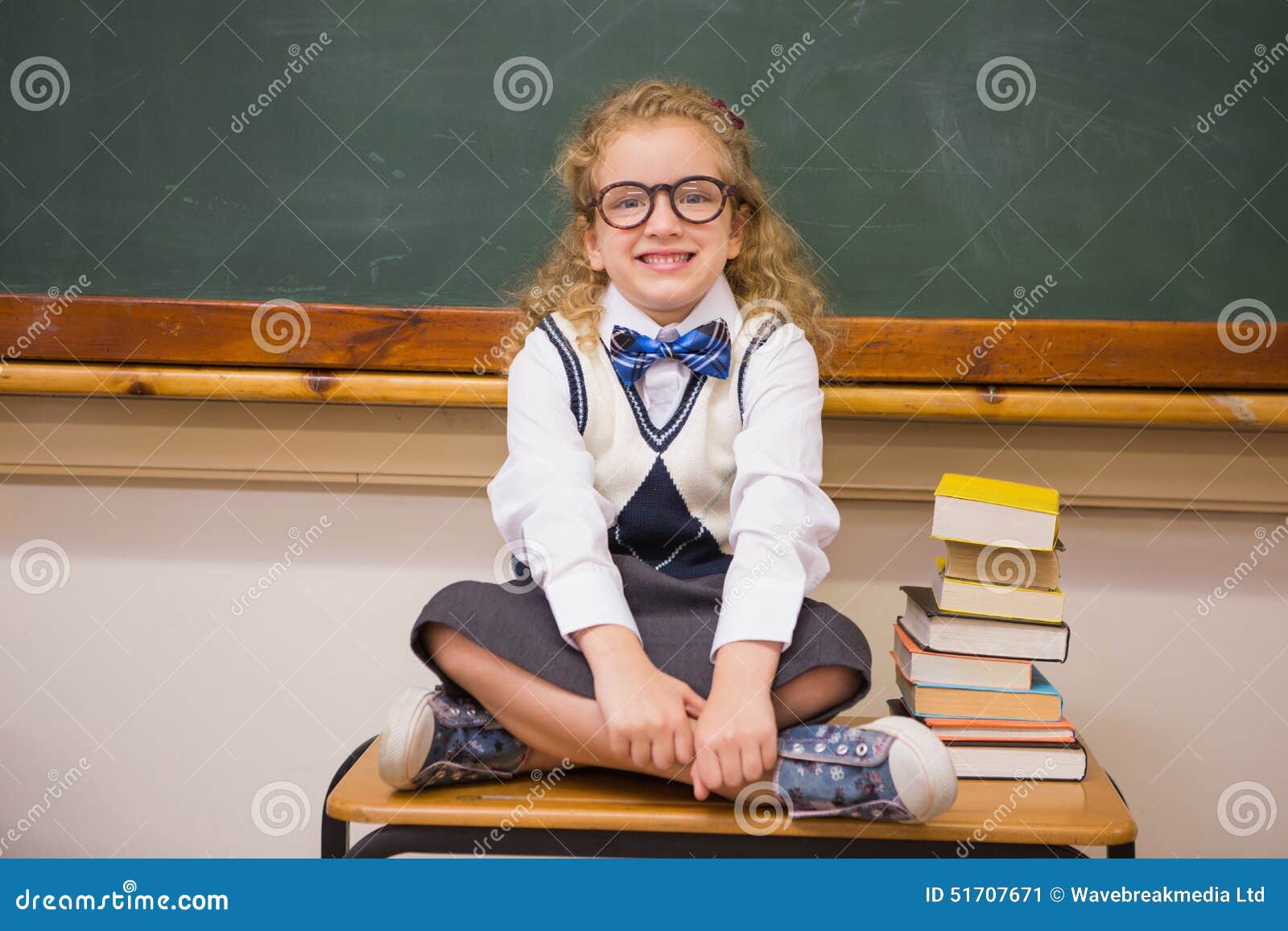 Cute Pupil Sitting on Table Stock Image - Image of person, classroom ...