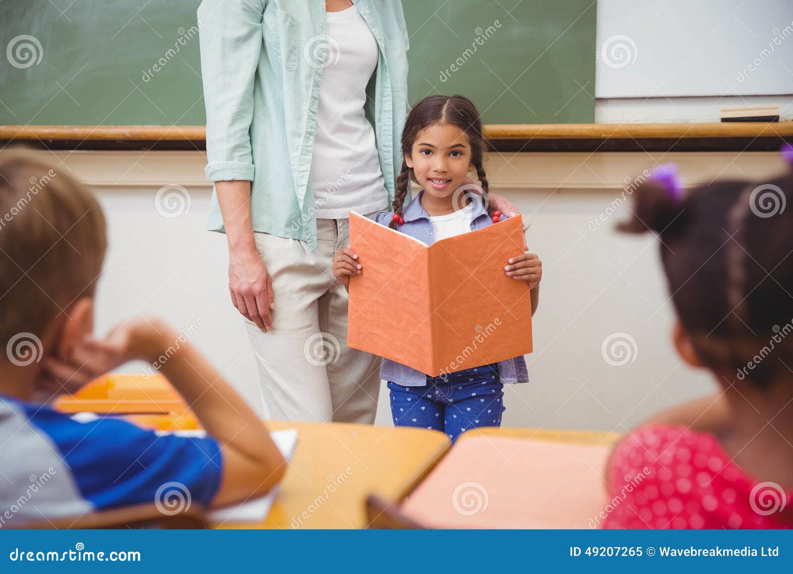 Cute Pupil Smiling at Camera during Class Presentation Stock Image ...