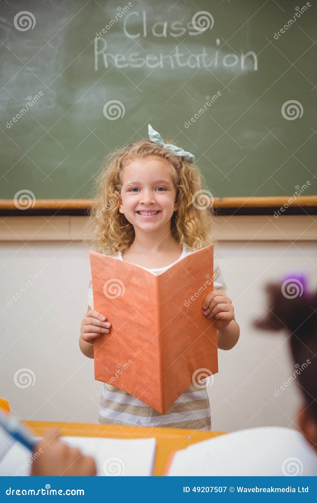 Cute Pupil Smiling at Camera during Class Presentation Stock Image ...