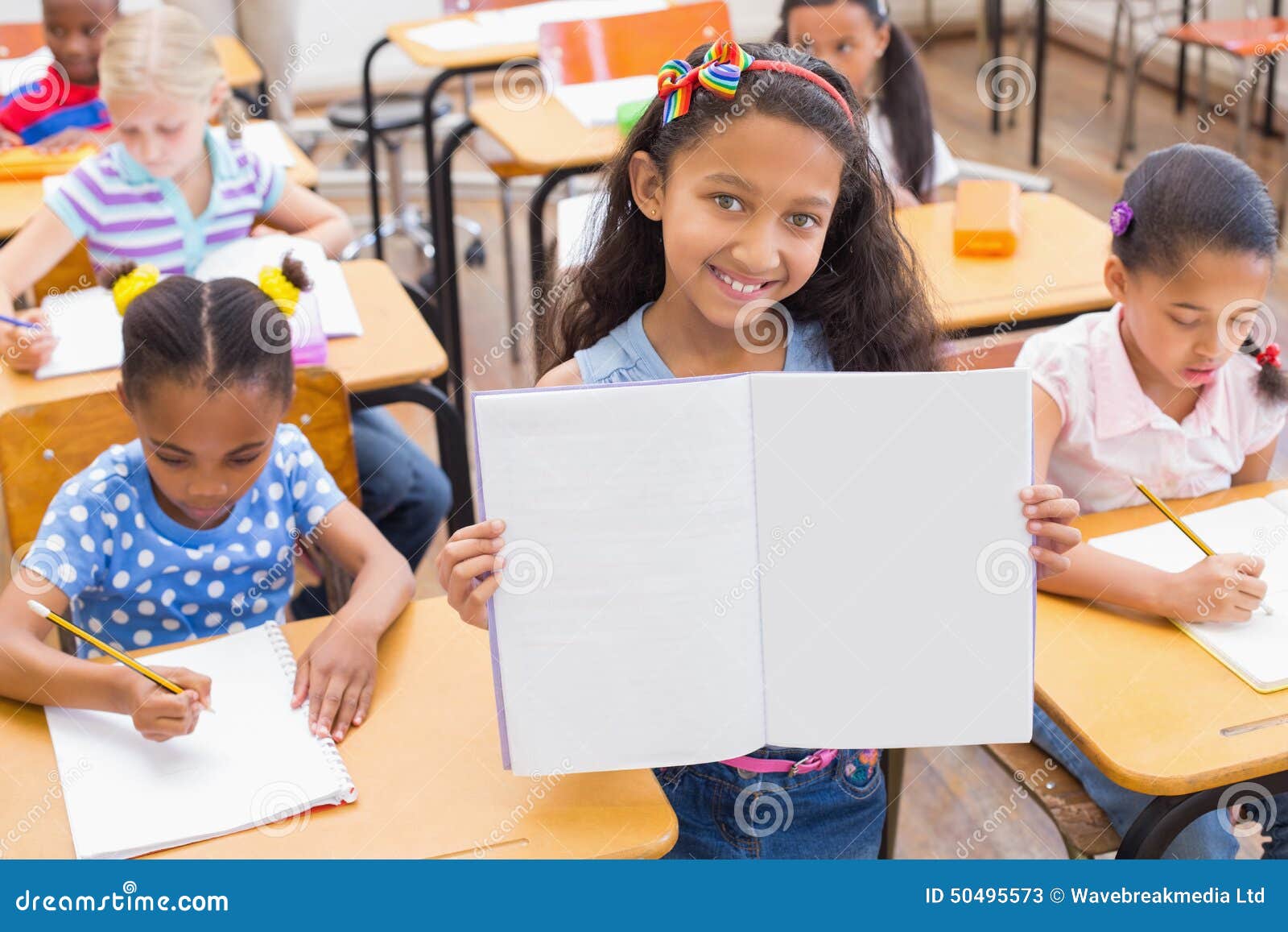 Cute Pupil Smiling at Camera during Class Presentation Stock Image ...