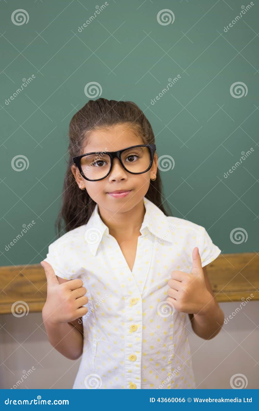 Cute Pupil Smiling at Camera in Classroom Stock Photo - Image of girl ...