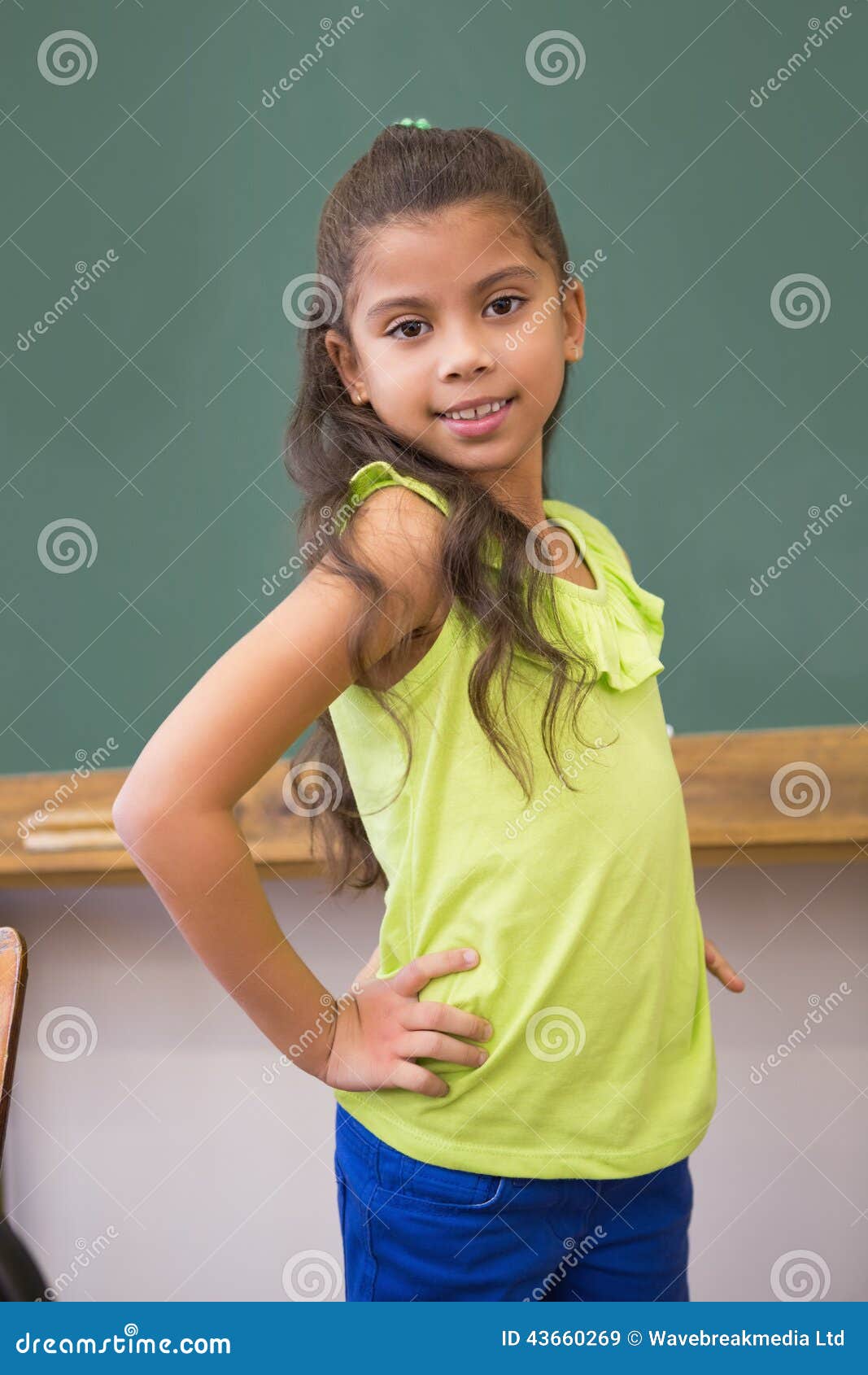 Cute Pupil Standing in Classroom Stock Image - Image of schoolchil ...