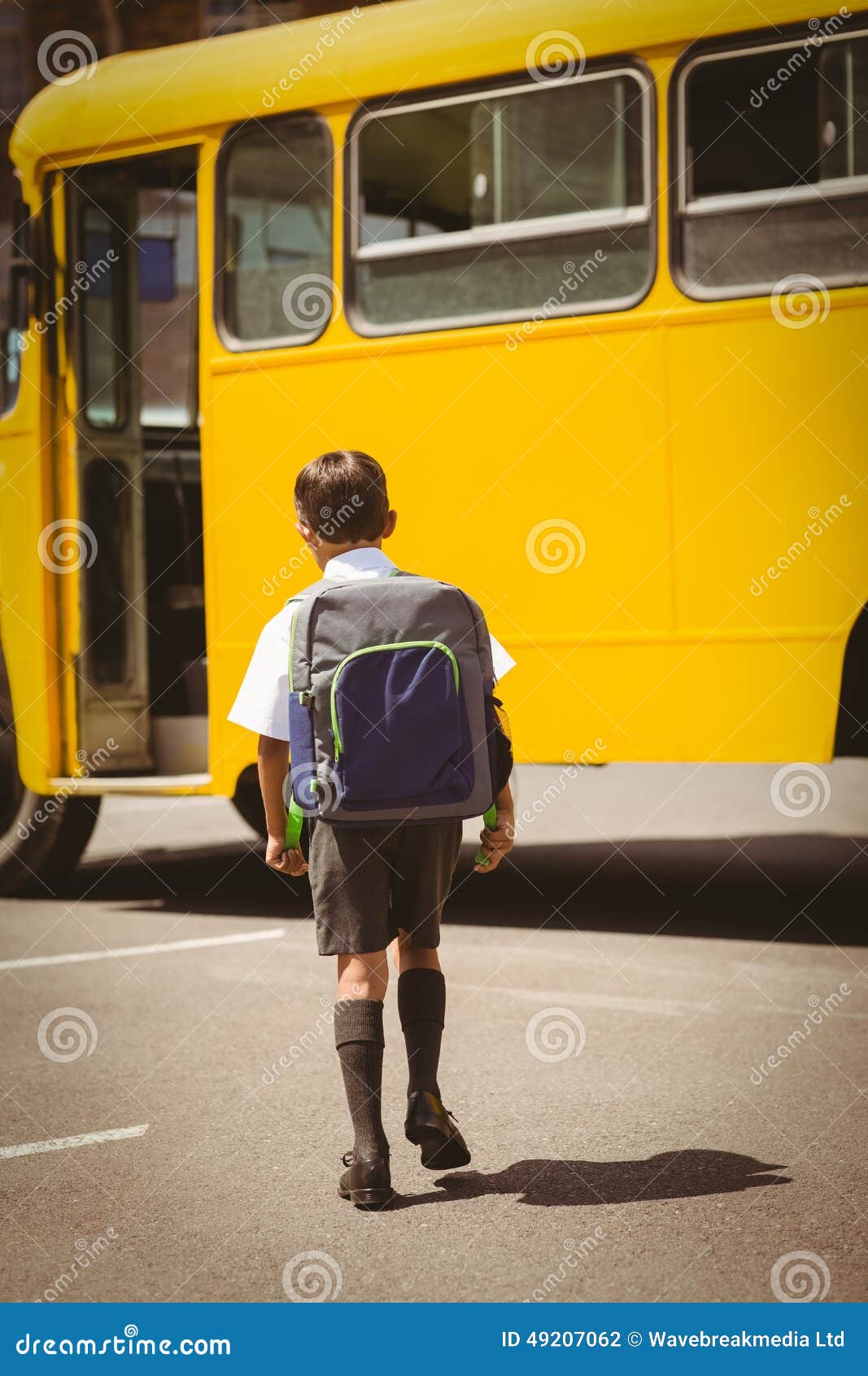 Cute Pupil Walking To the School Bus Stock Photo - Image of elementary ...