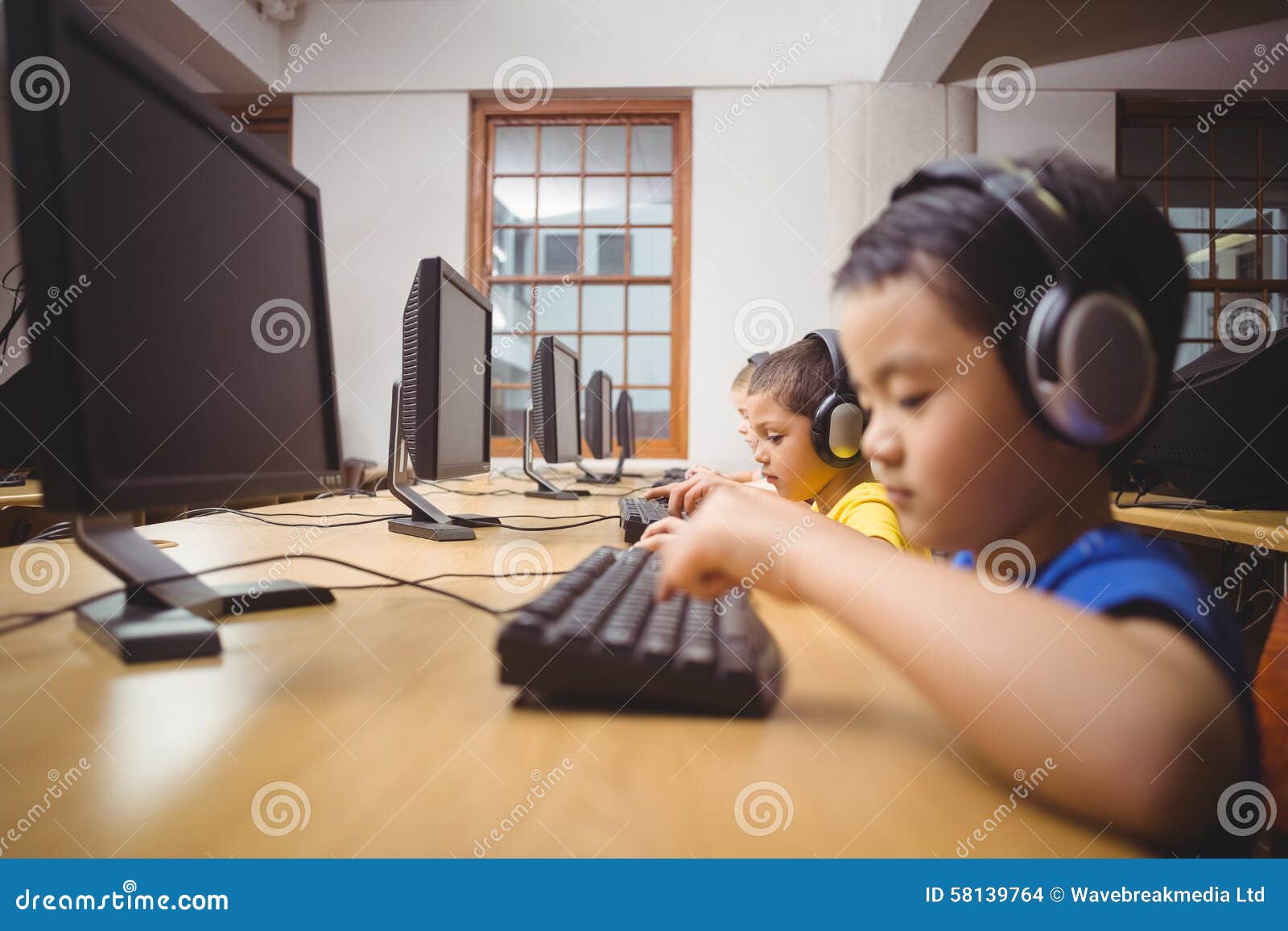 Cute Pupils in Computer Class Stock Photo - Image of thoughtful ...
