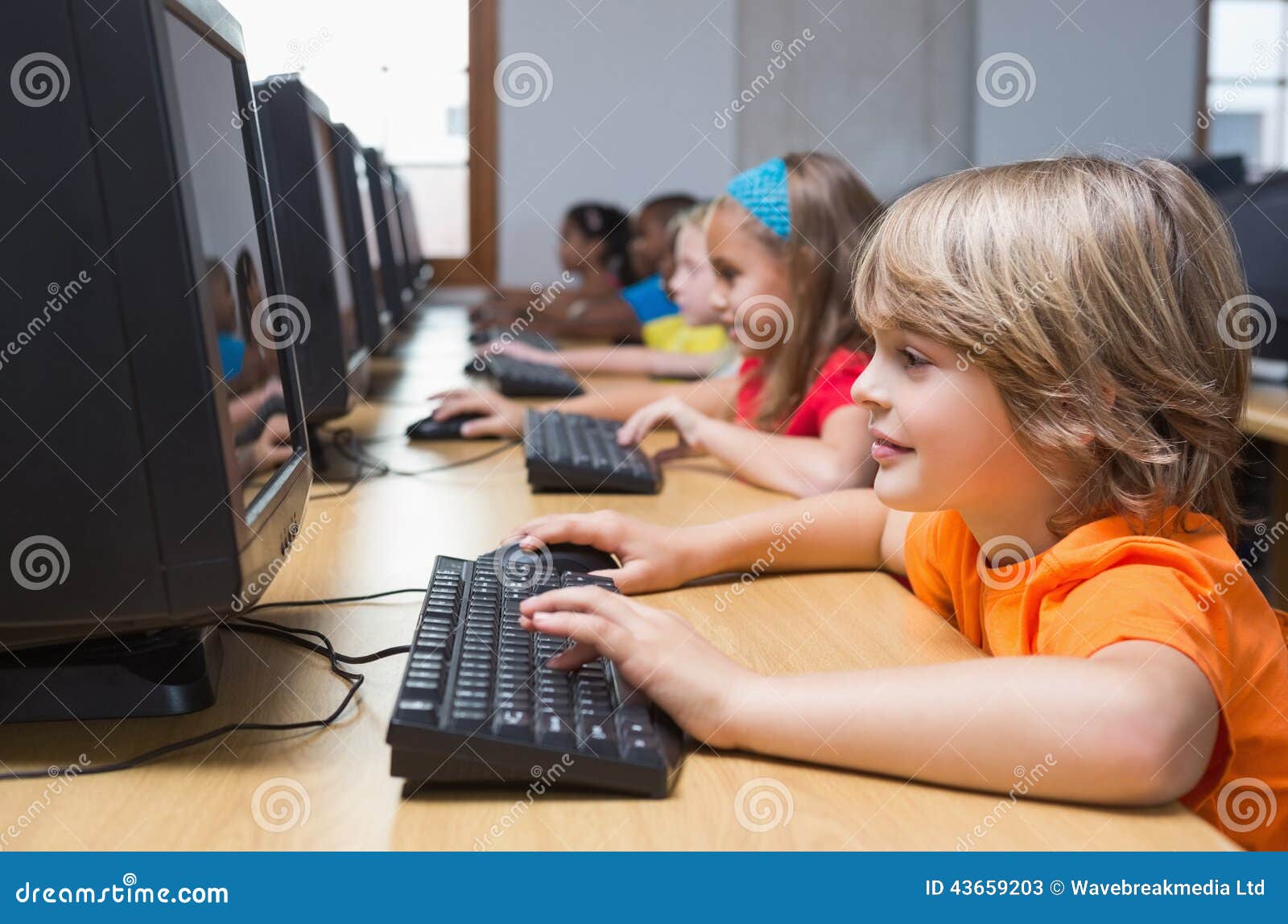 Cute Pupils in Computer Class Stock Image - Image of education, male ...