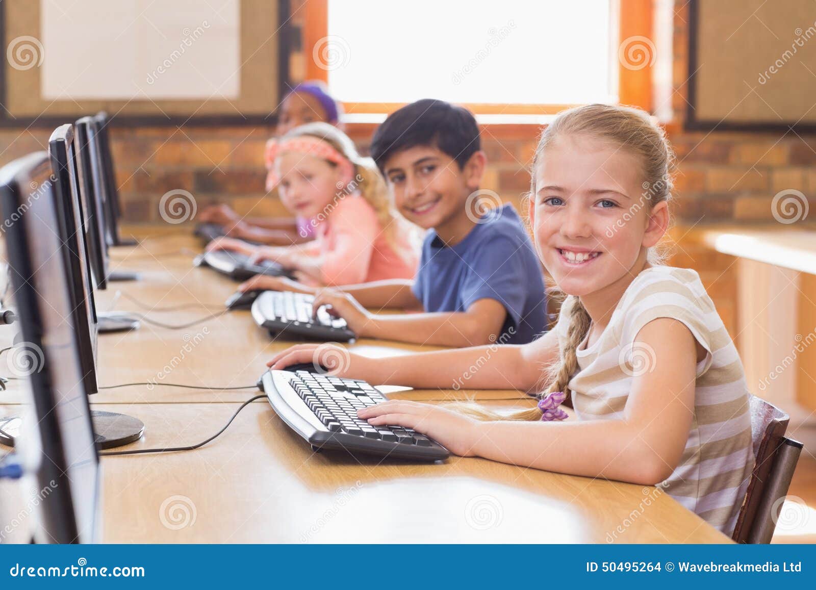 Cute Pupils in Computer Class Stock Photo - Image of female, happy ...