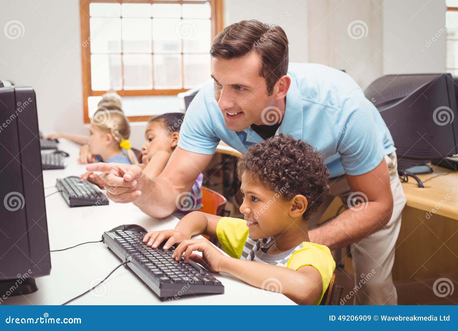 Cute Pupils in Computer Class with Teacher Stock Image - Image of ...