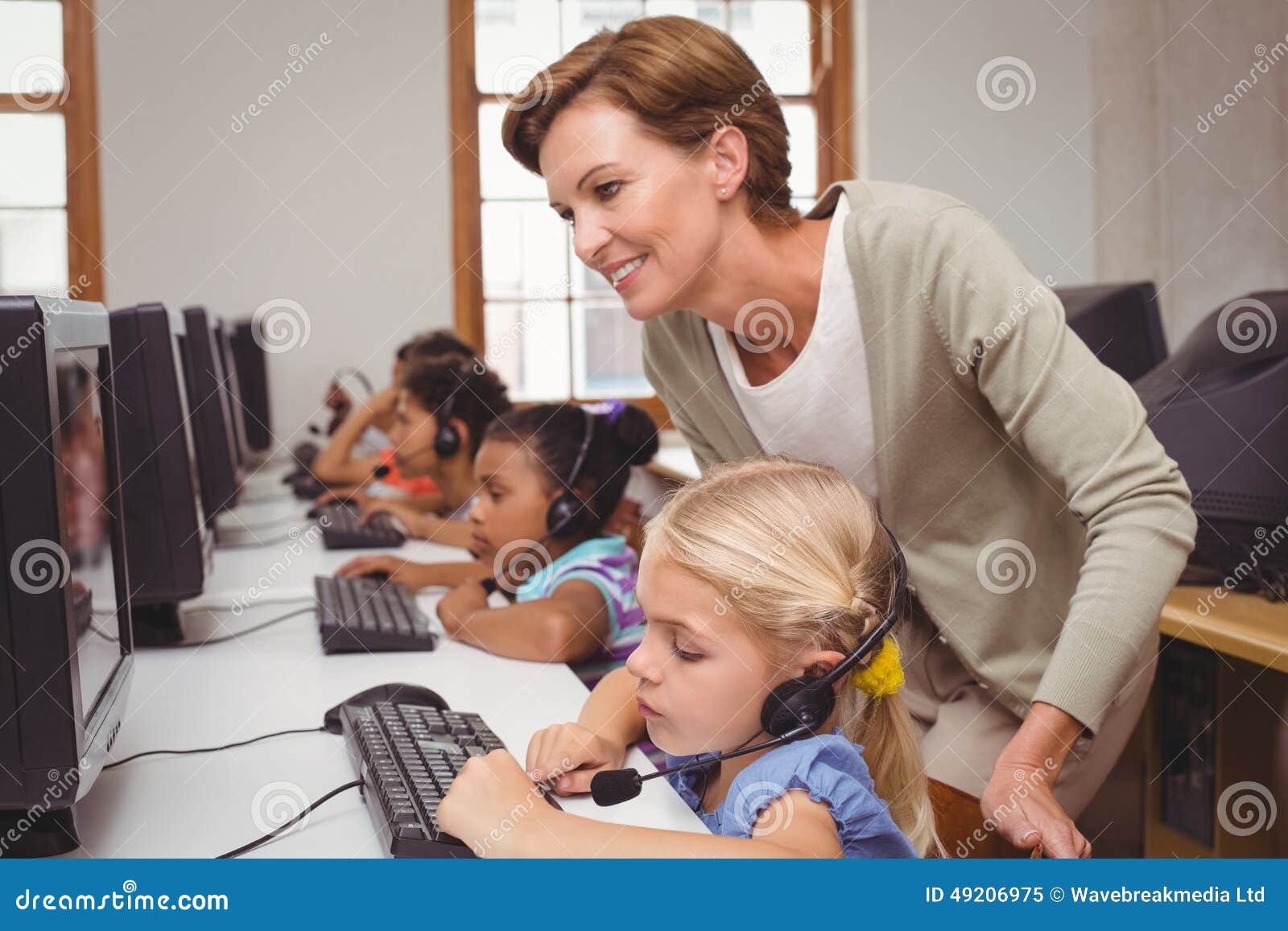 Cute Pupils in Computer Class with Teacher Stock Image - Image of ...
