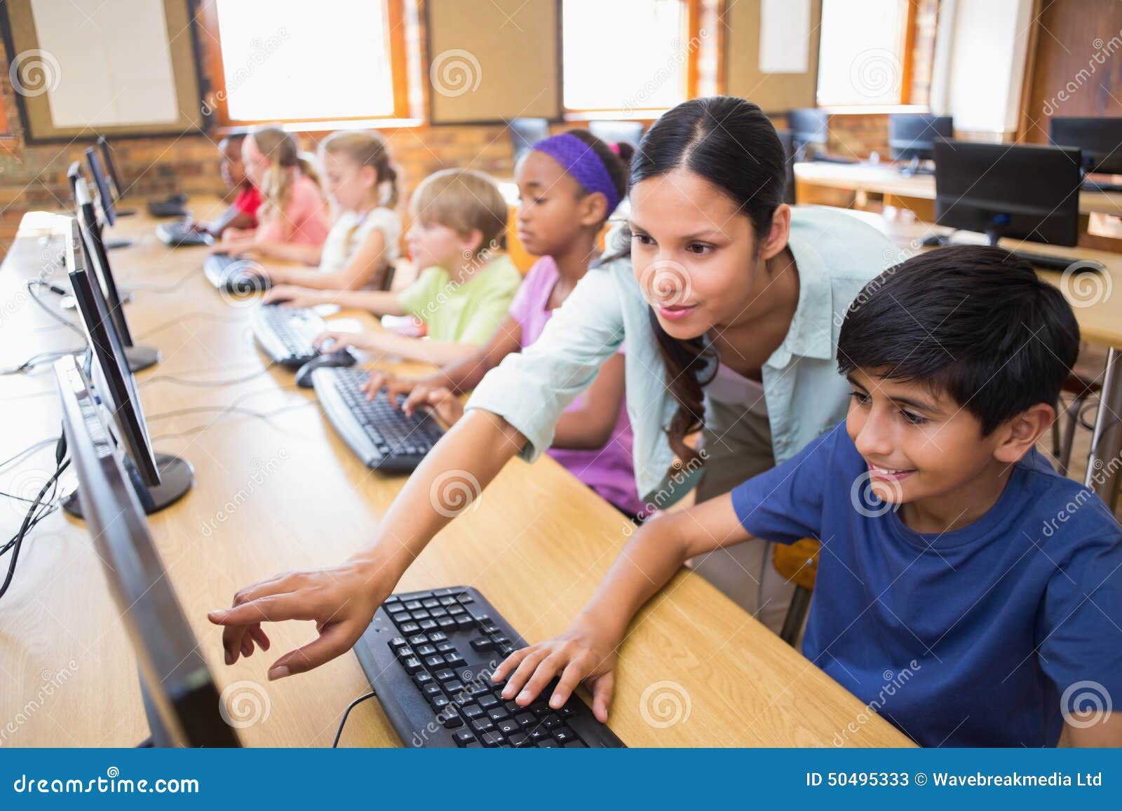 Cute Pupils in Computer Class with Teacher Stock Image - Image of ...