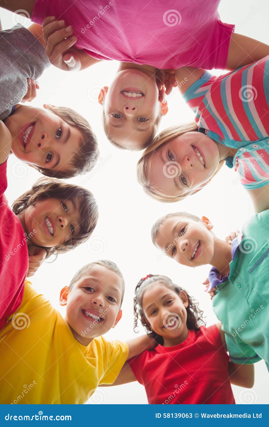Cute pupils in a huddle stock image. Image of cute, girl - 58139063