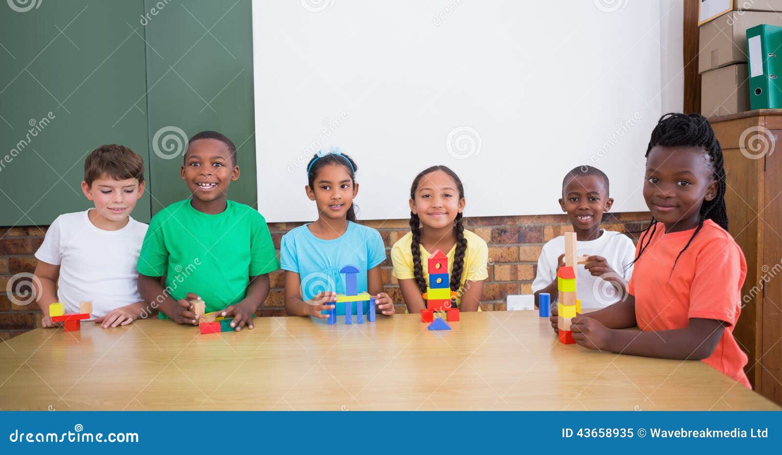 Cute Pupils Playing with Building Blocks Stock Image - Image of group ...