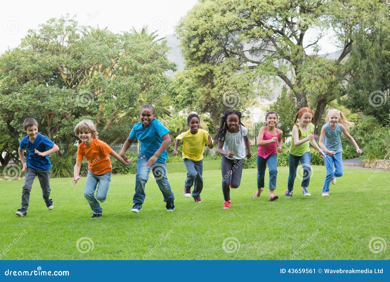 Cute Pupils Racing on the Grass Outside Stock Image - Image of ...