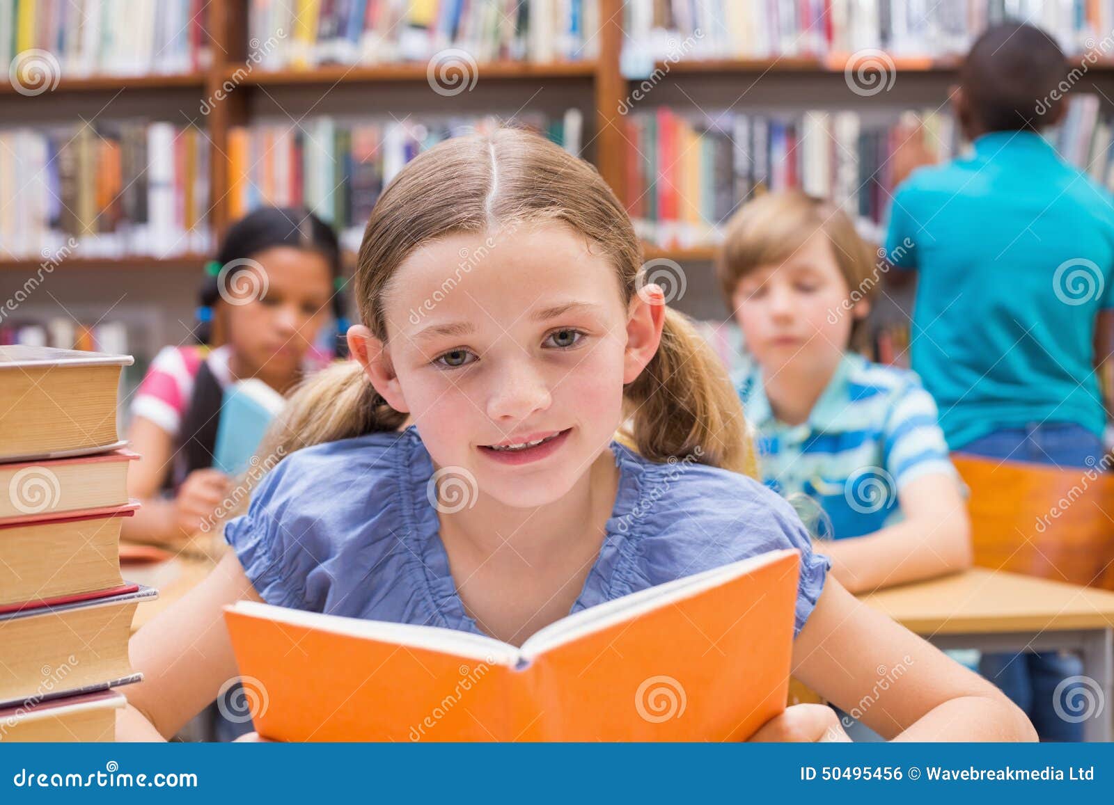 Cute Pupils Reading in Library Stock Photo - Image of child, knowledge ...