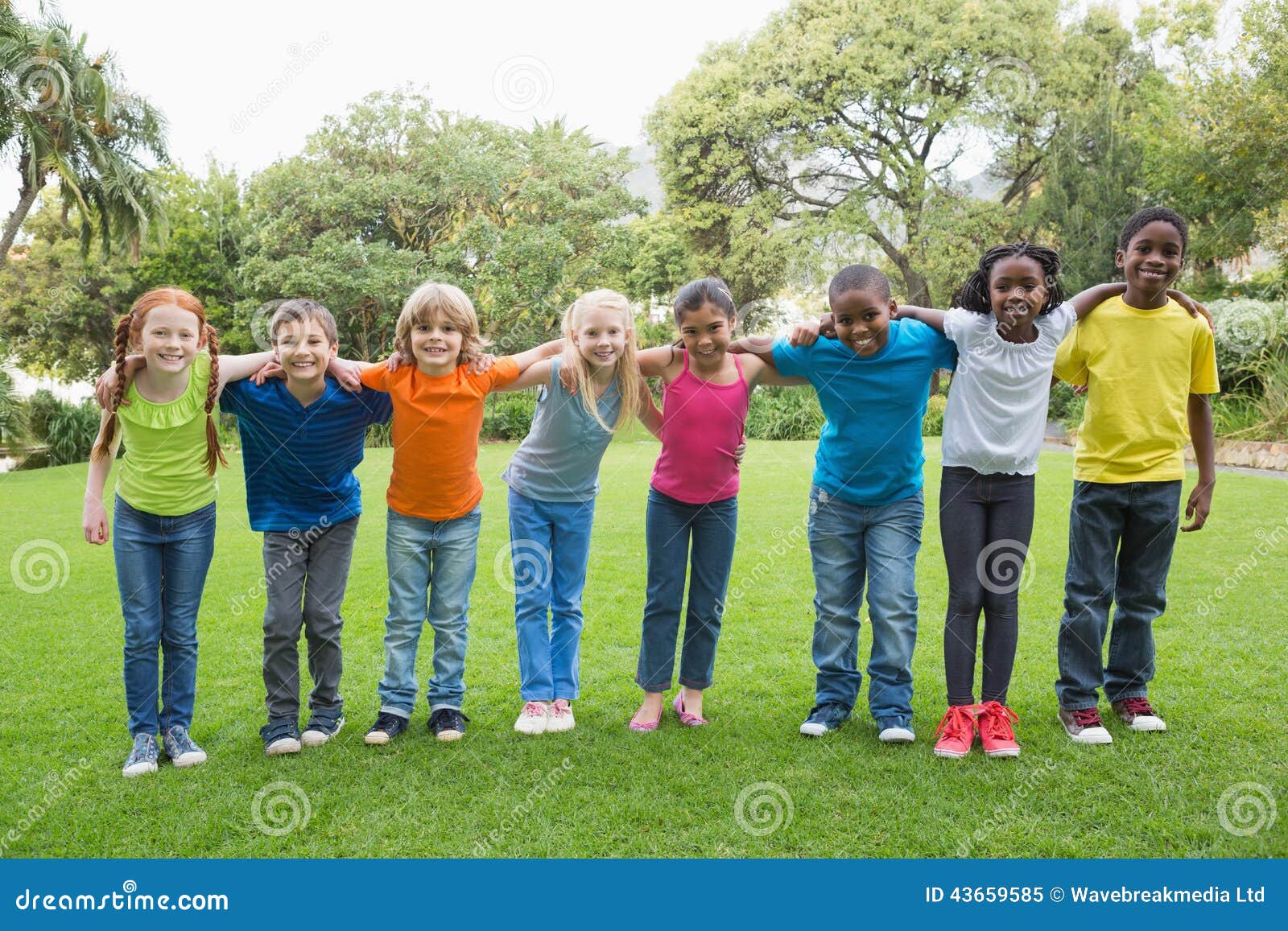 Cute Pupils Standing on the Grass Outside Stock Image - Image of ...