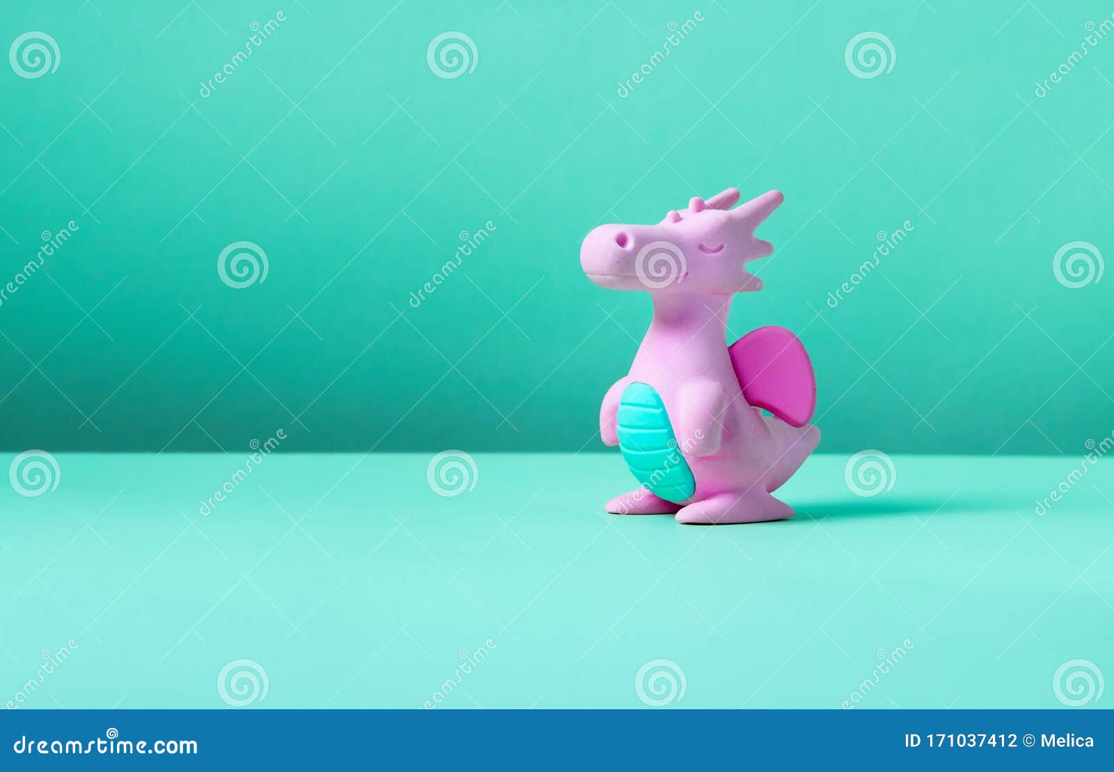Cute rubber dragon toy stock photo. Image of monster - 171037412